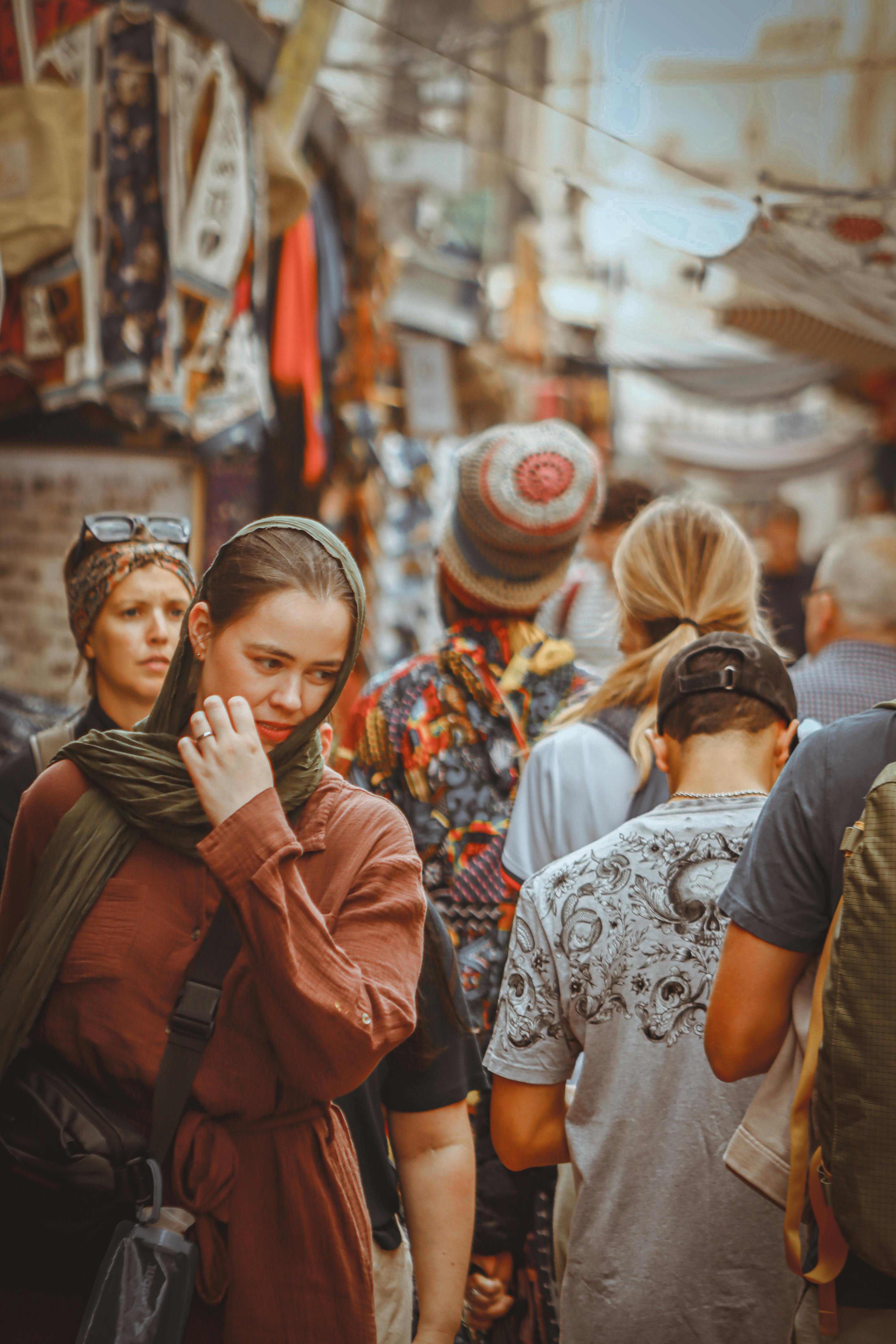 Bustling Market Scene with Diverse Crowd · Free Stock Photo