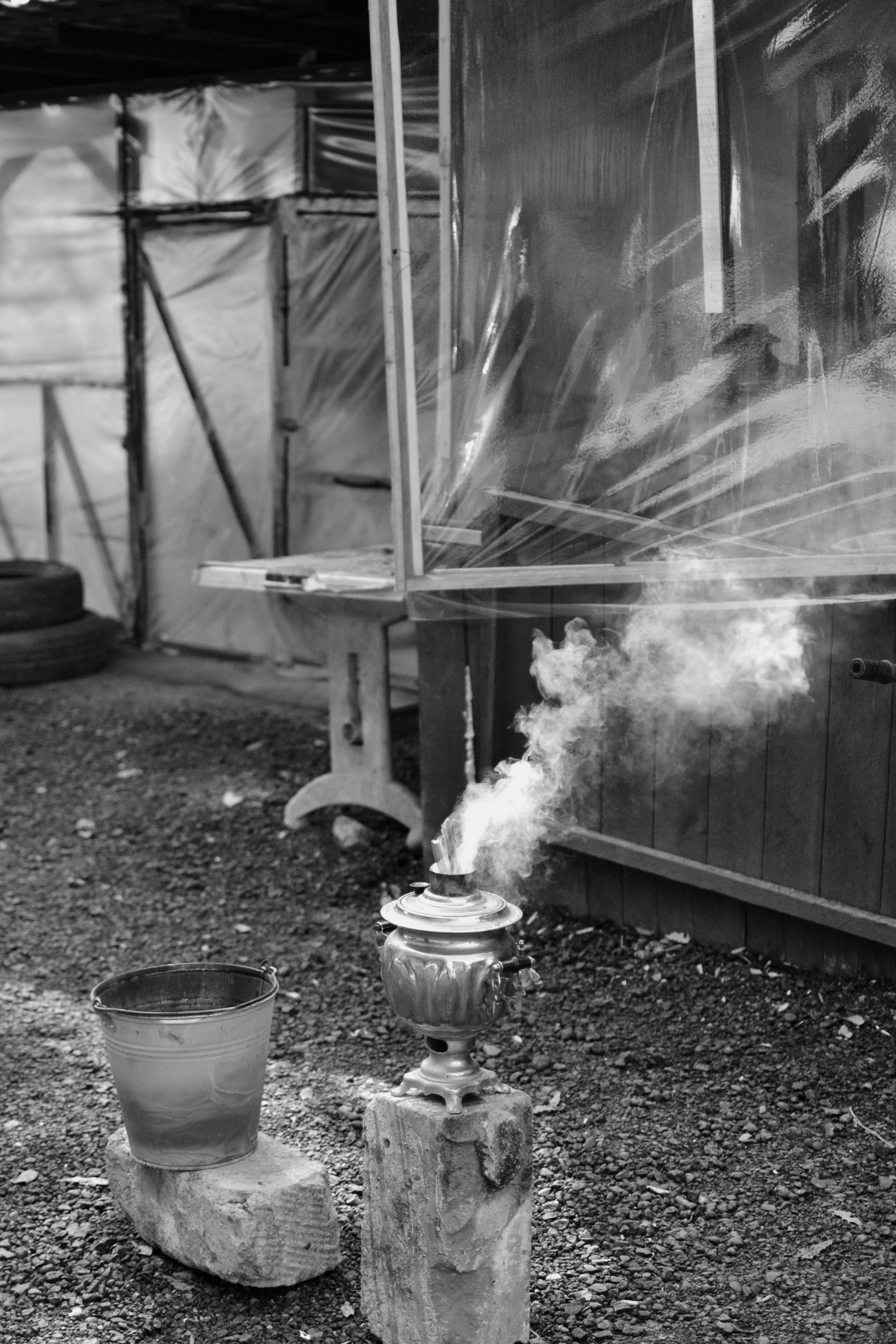 Rustic Outdoor Scene with Steaming Samovar · Free Stock Photo
