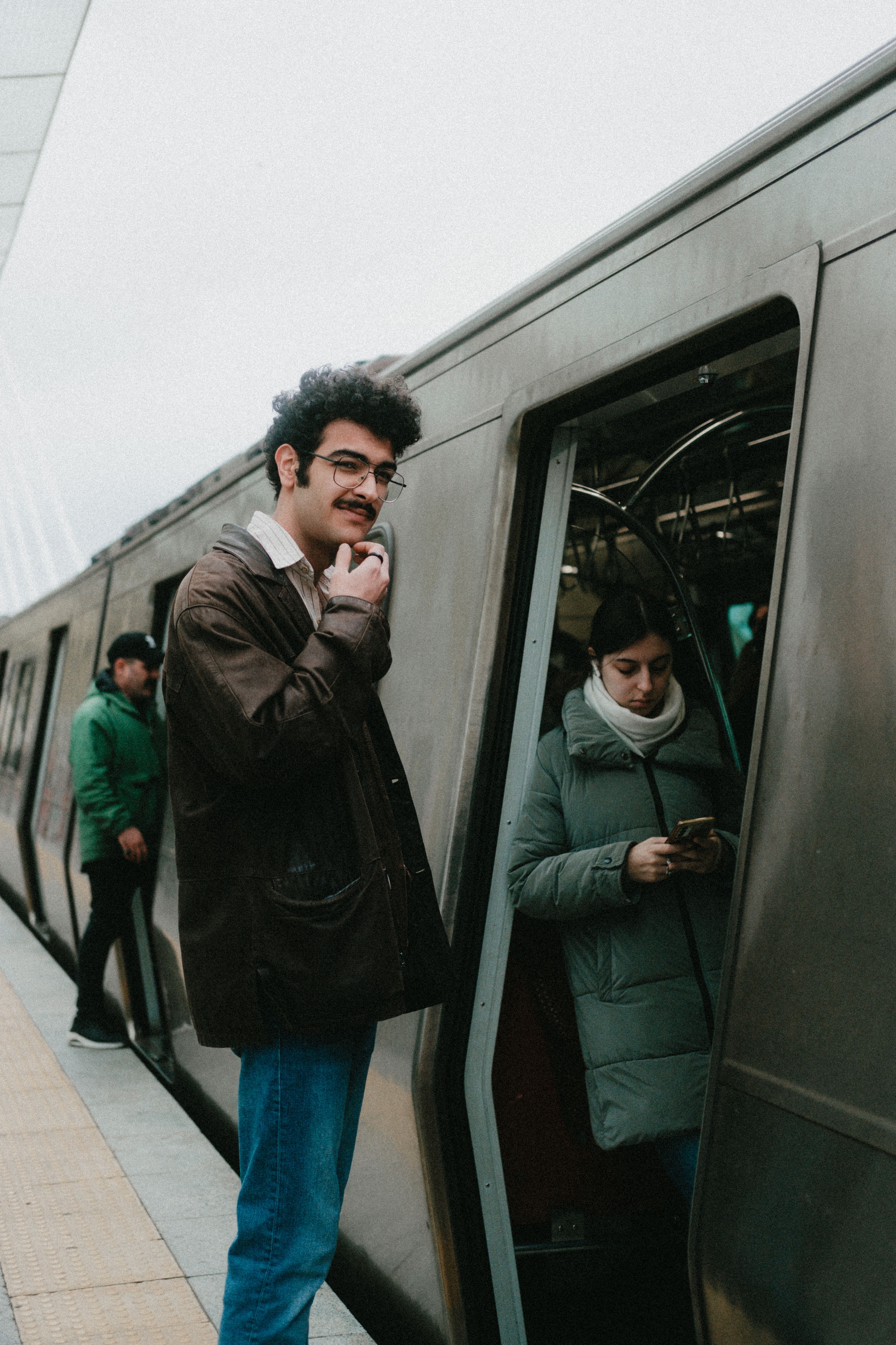Casual Commuter Waiting Beside Modern Subway · Free Stock Photo