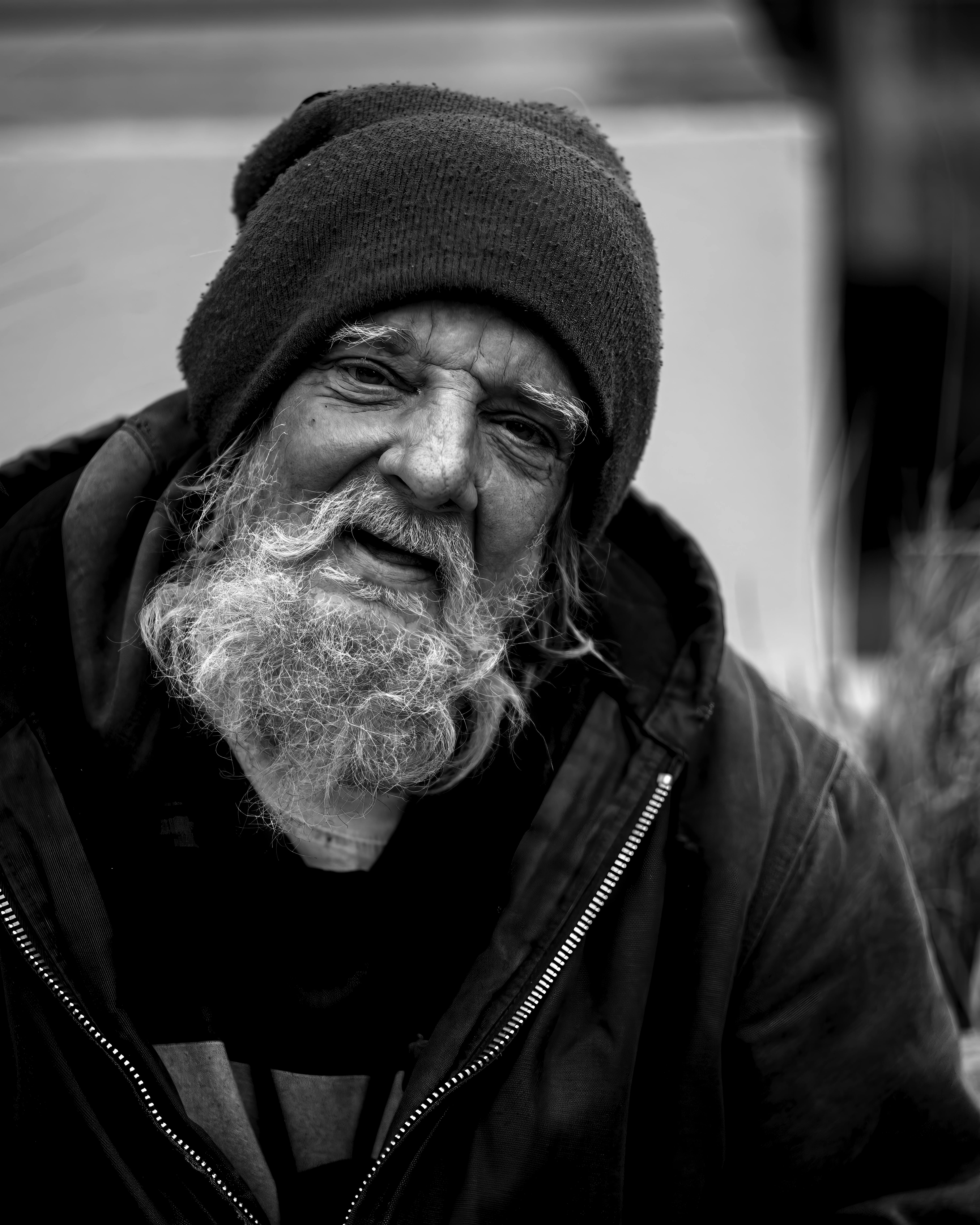 Black and White Portrait of a Bearded Man Outdoors · Free Stock Photo