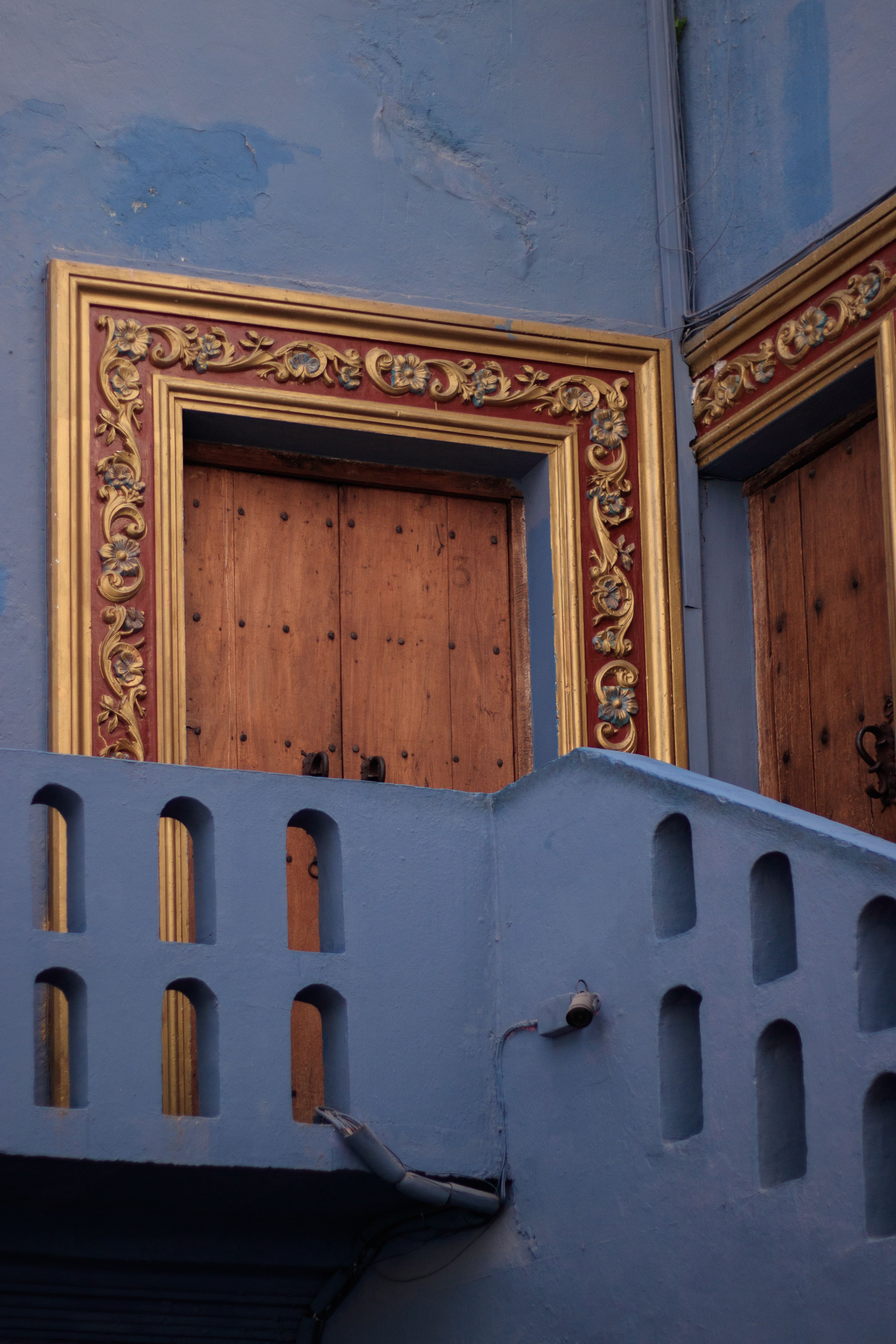 Baroque Blue Facade with Ornate Wooden Door · Free Stock Photo