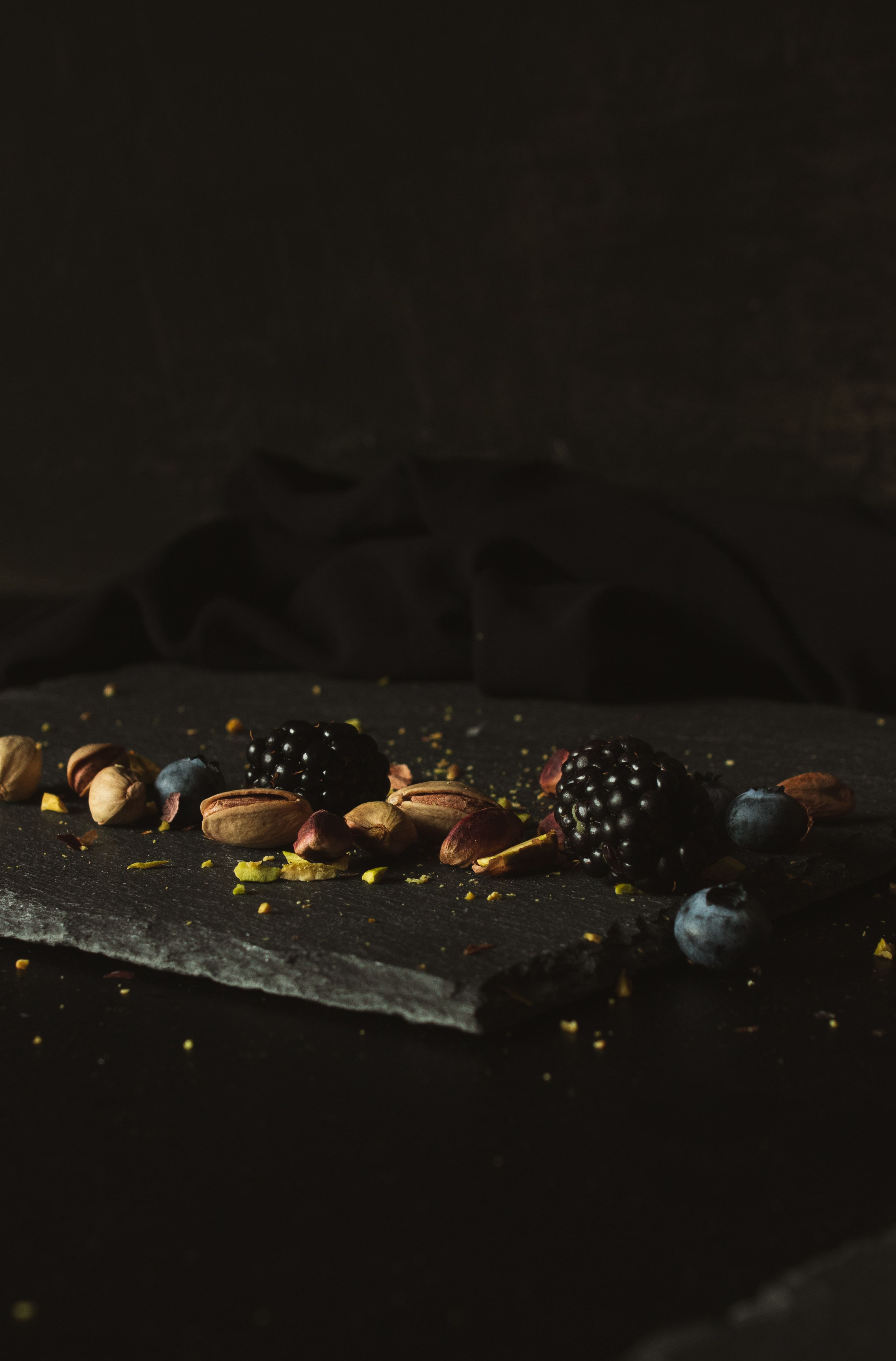 Dark Food Photography with Berries and Nuts · Free Stock Photo