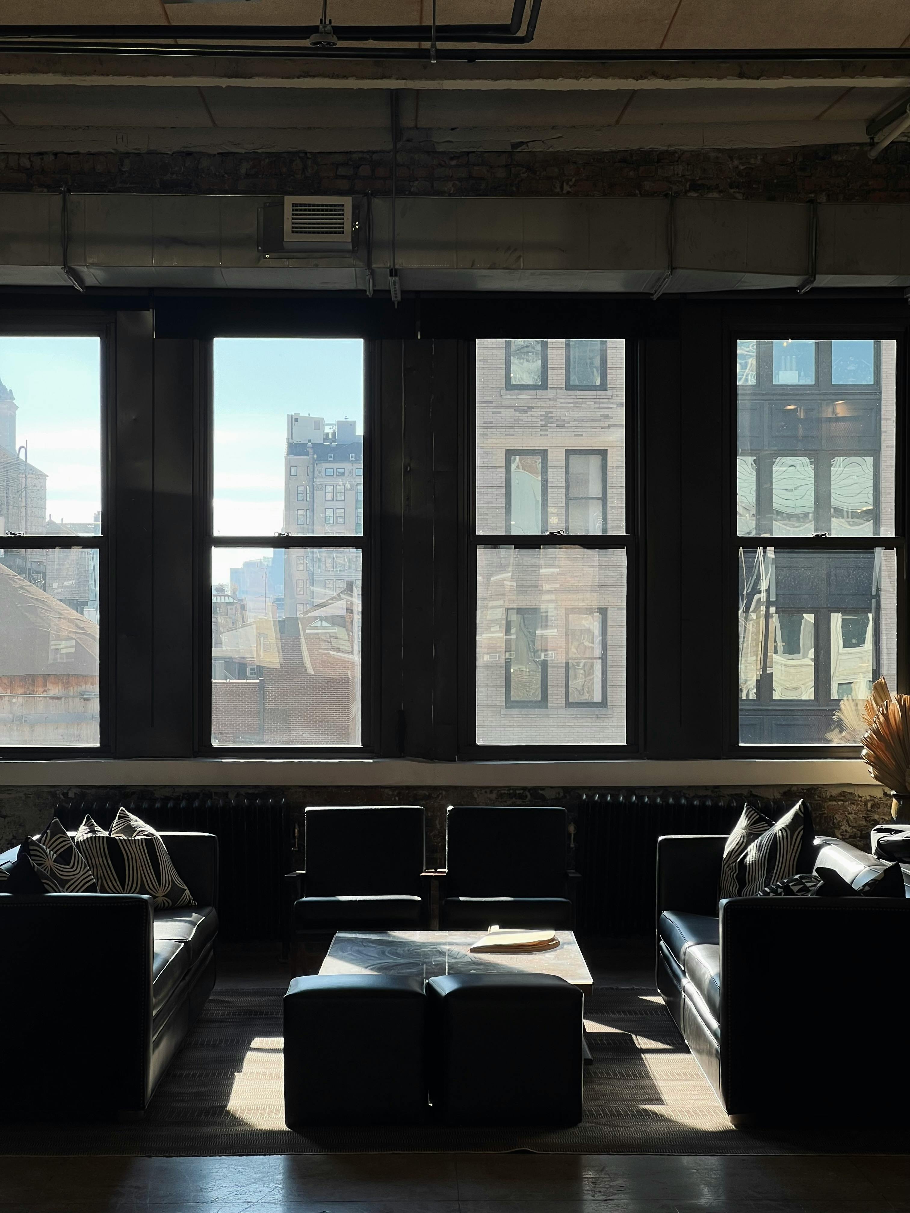 Modern Urban Loft with Large Windows · Free Stock Photo