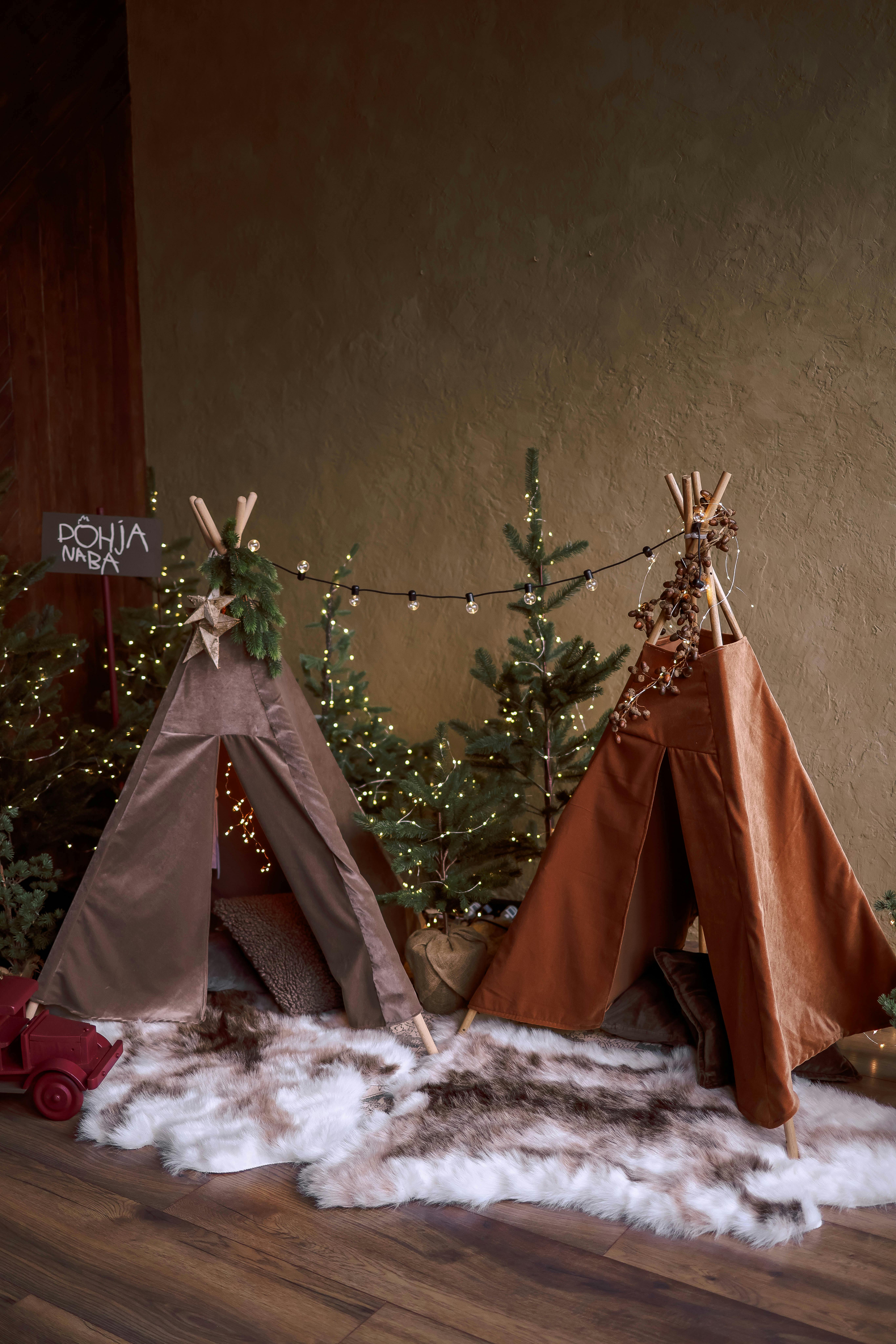 Cozy Indoor Teepee Setup with Festive Decor · Free Stock Photo