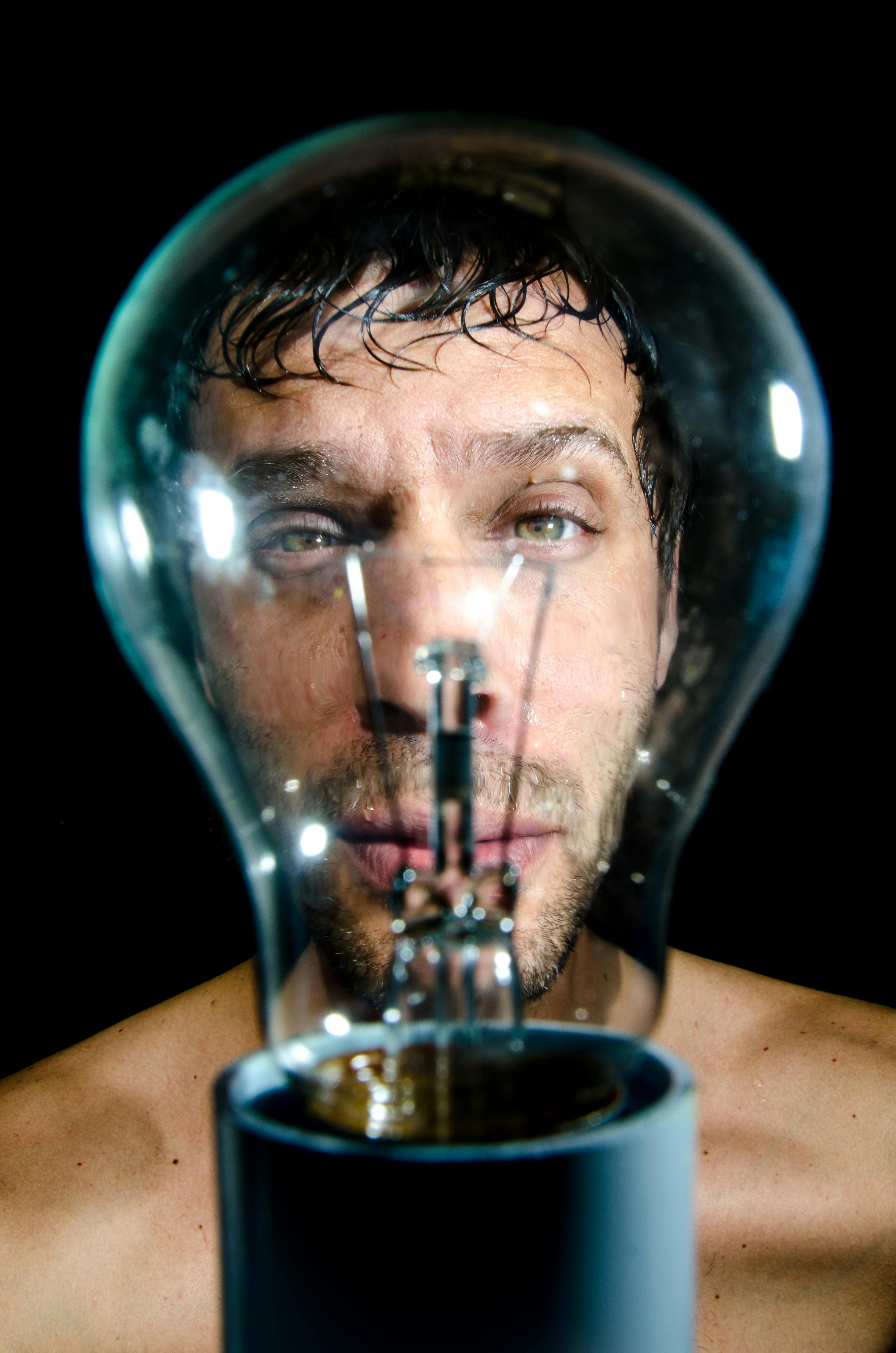 Creative Portrait with Lightbulb Reflection · Free Stock Photo