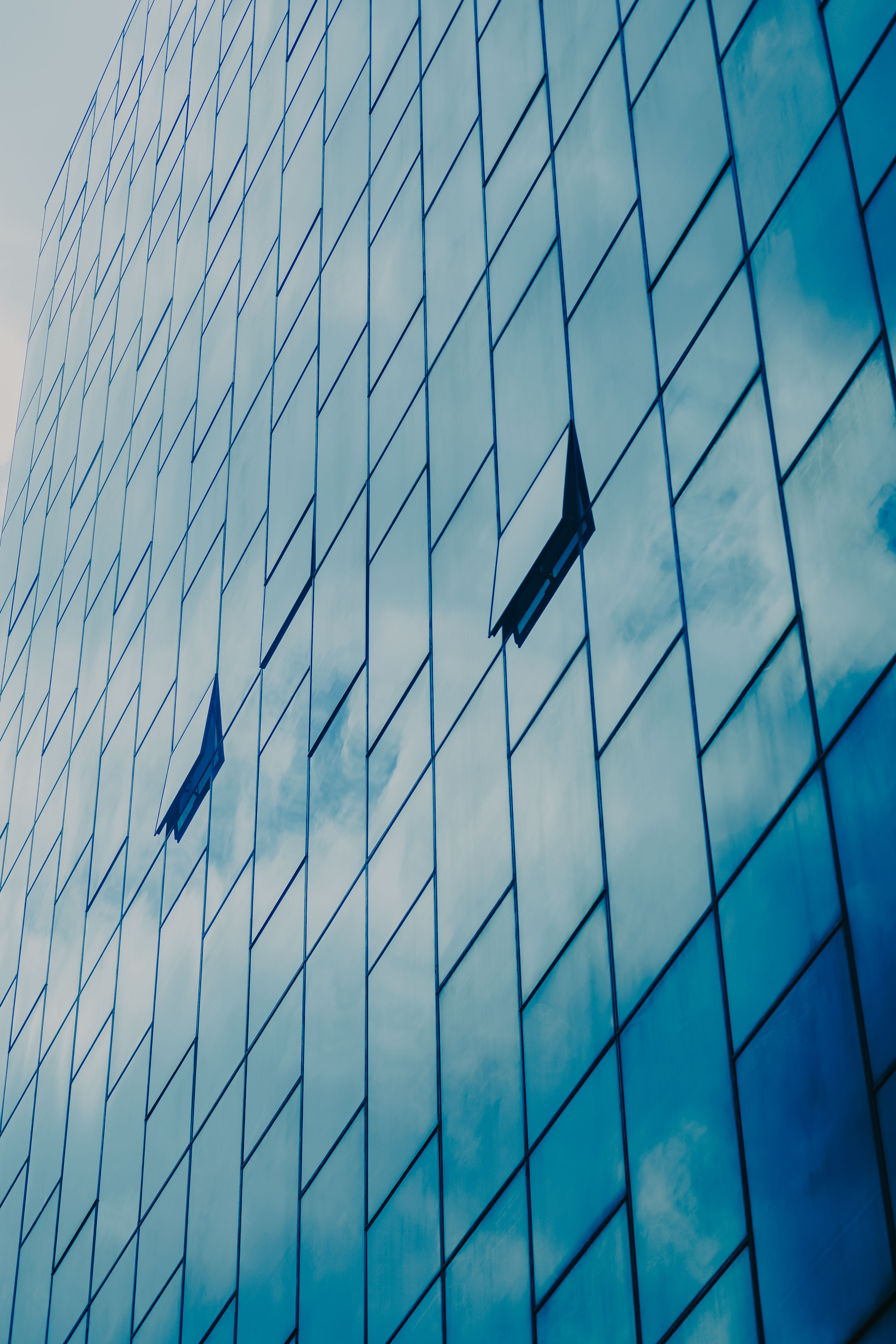 Modern Glass Building Reflection with Open Windows · Free Stock Photo
