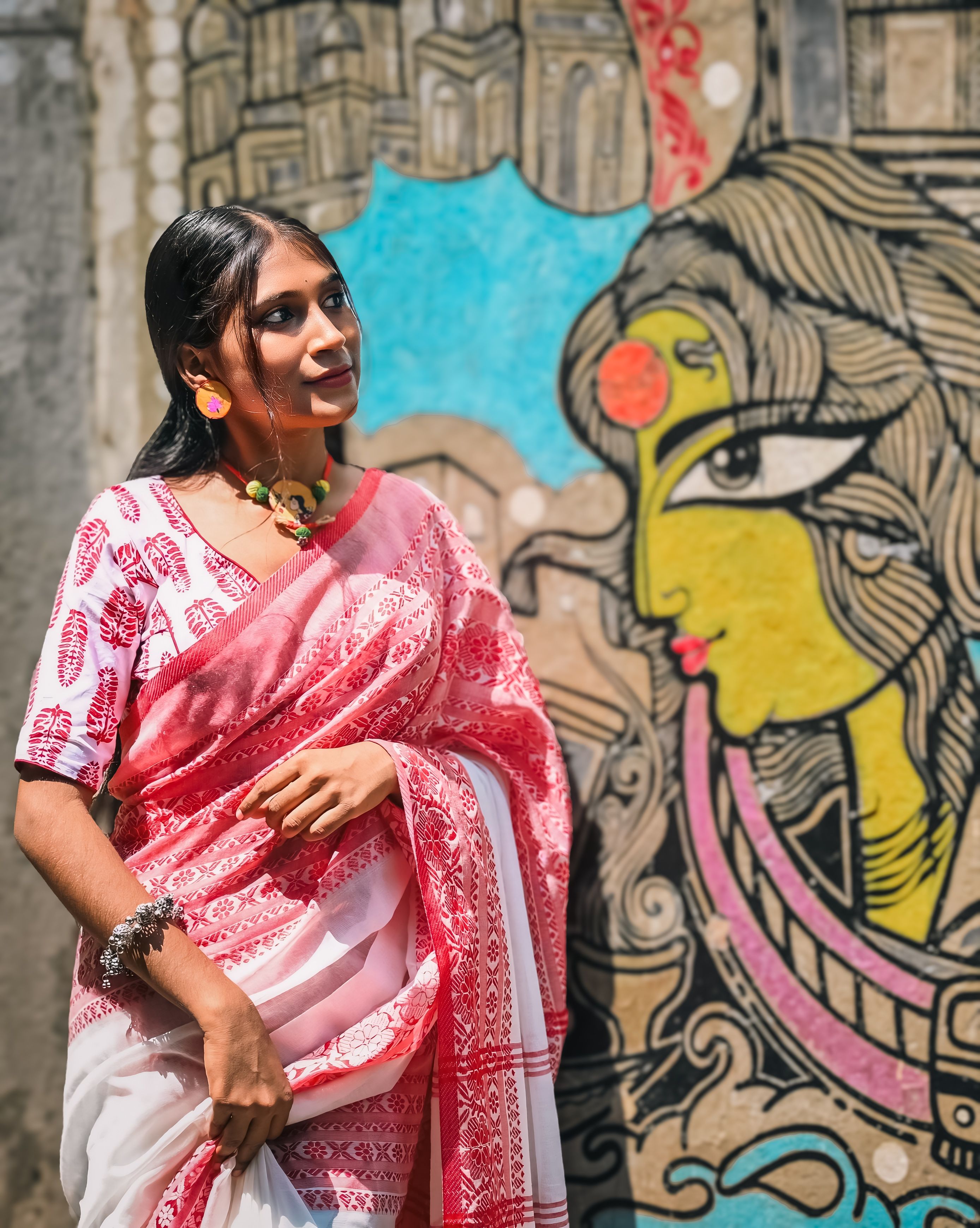 Cultural Portrait with Vibrant Street Art Background · Free Stock Photo