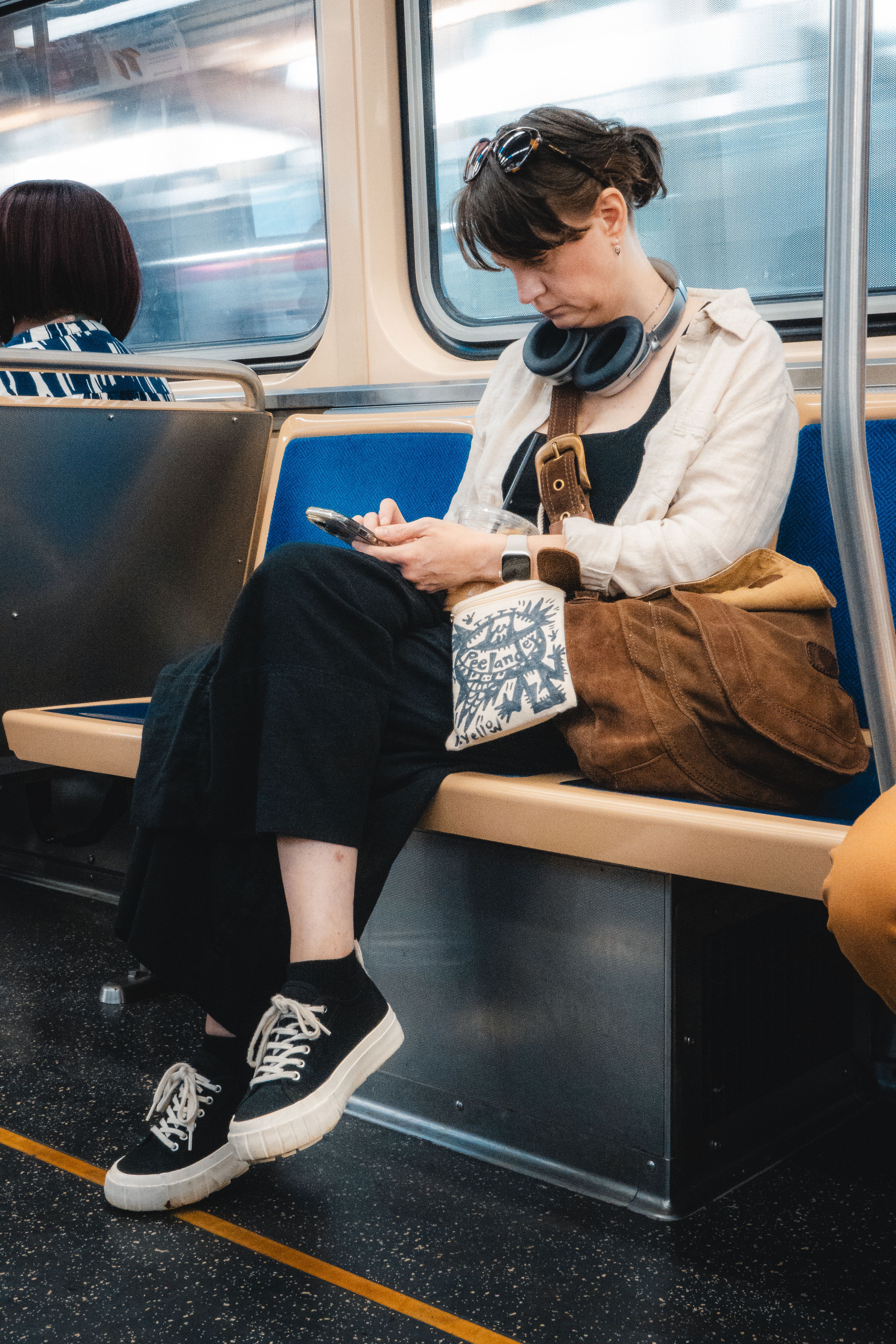 Commuter on Public Transit with Headphones · Free Stock Photo
