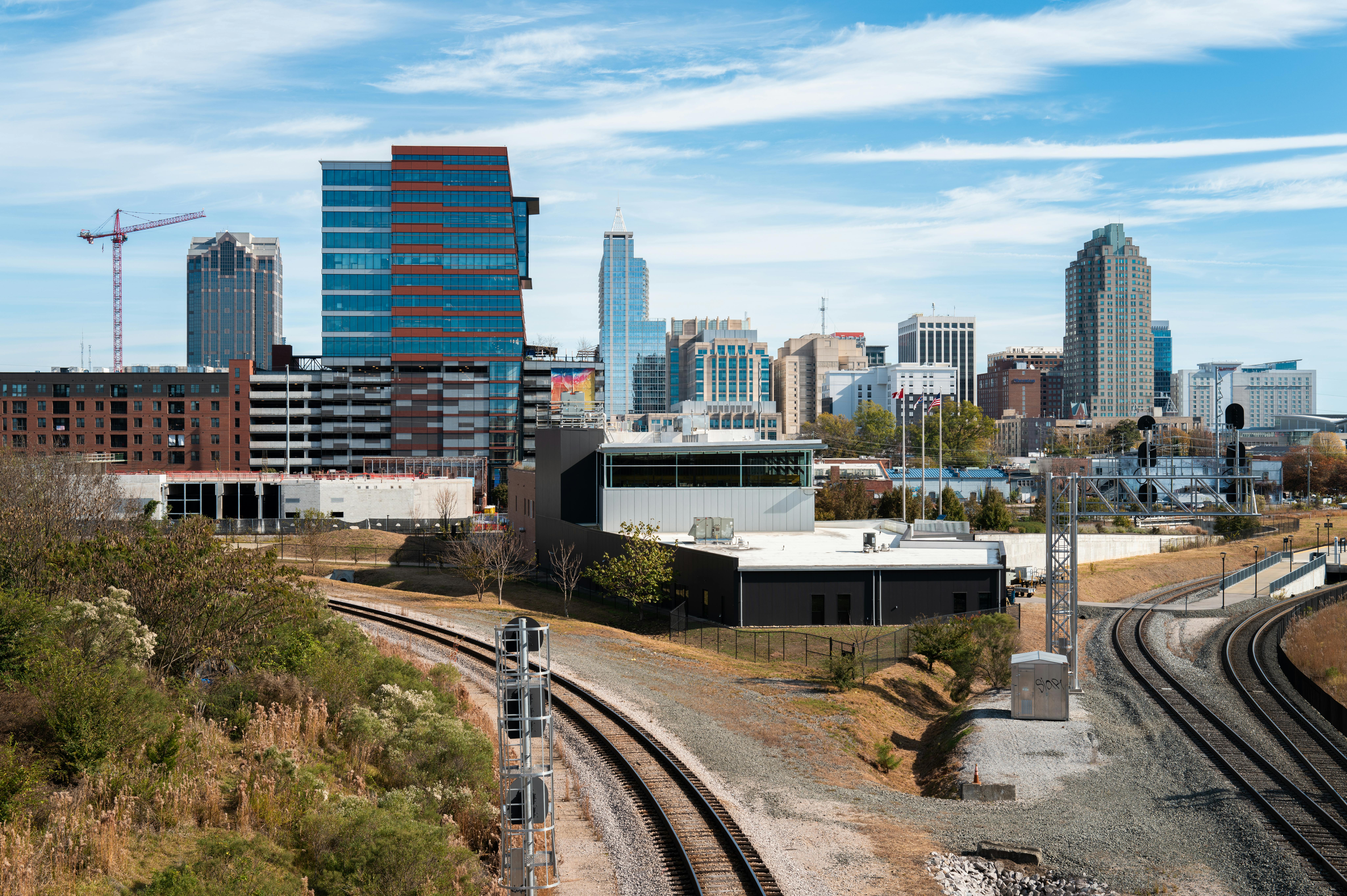 Aerial View of Raleigh Skyline with Rail Lines · Free Stock Photo