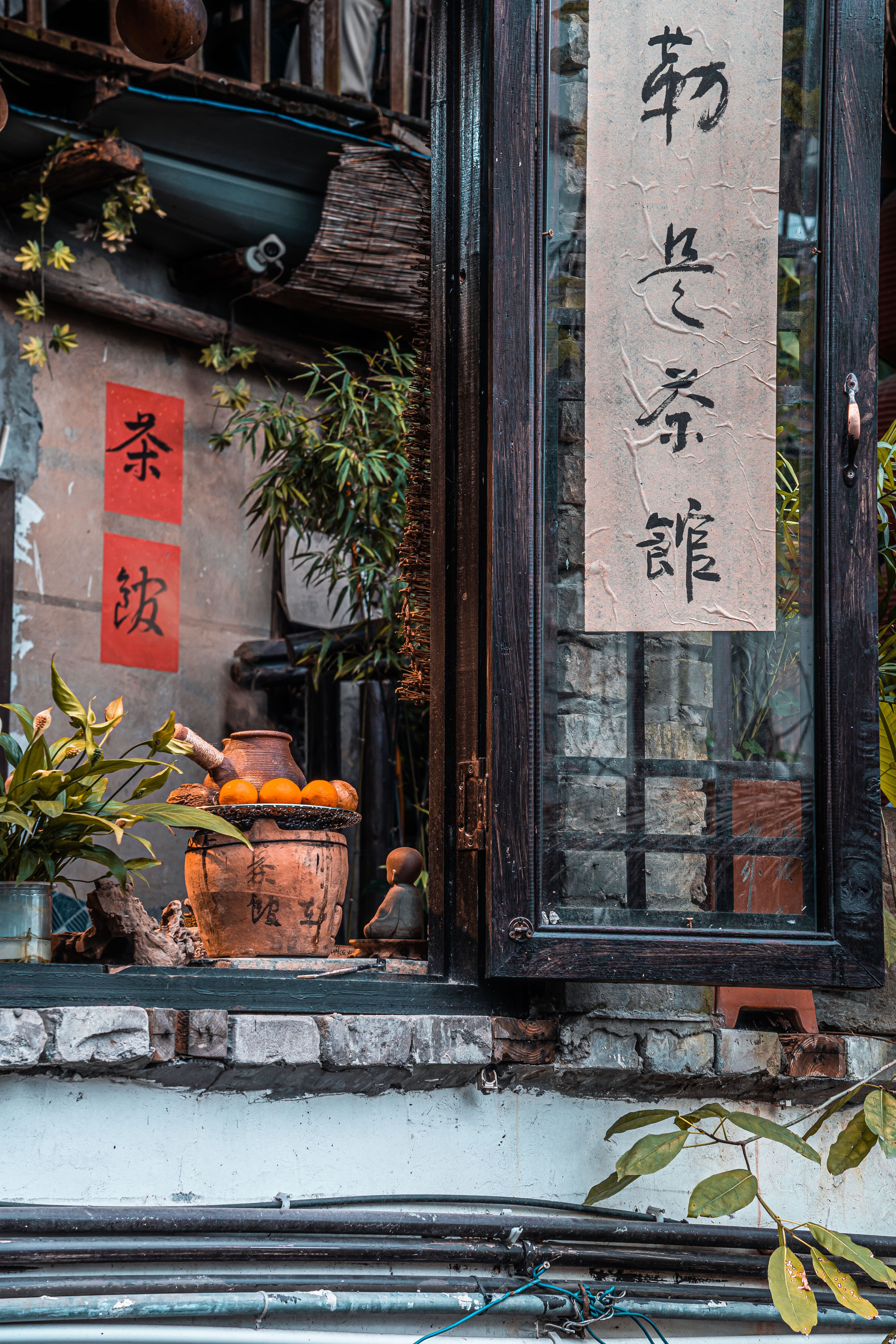 Rustic Outdoor Scene with Cultural Decor · Free Stock Photo