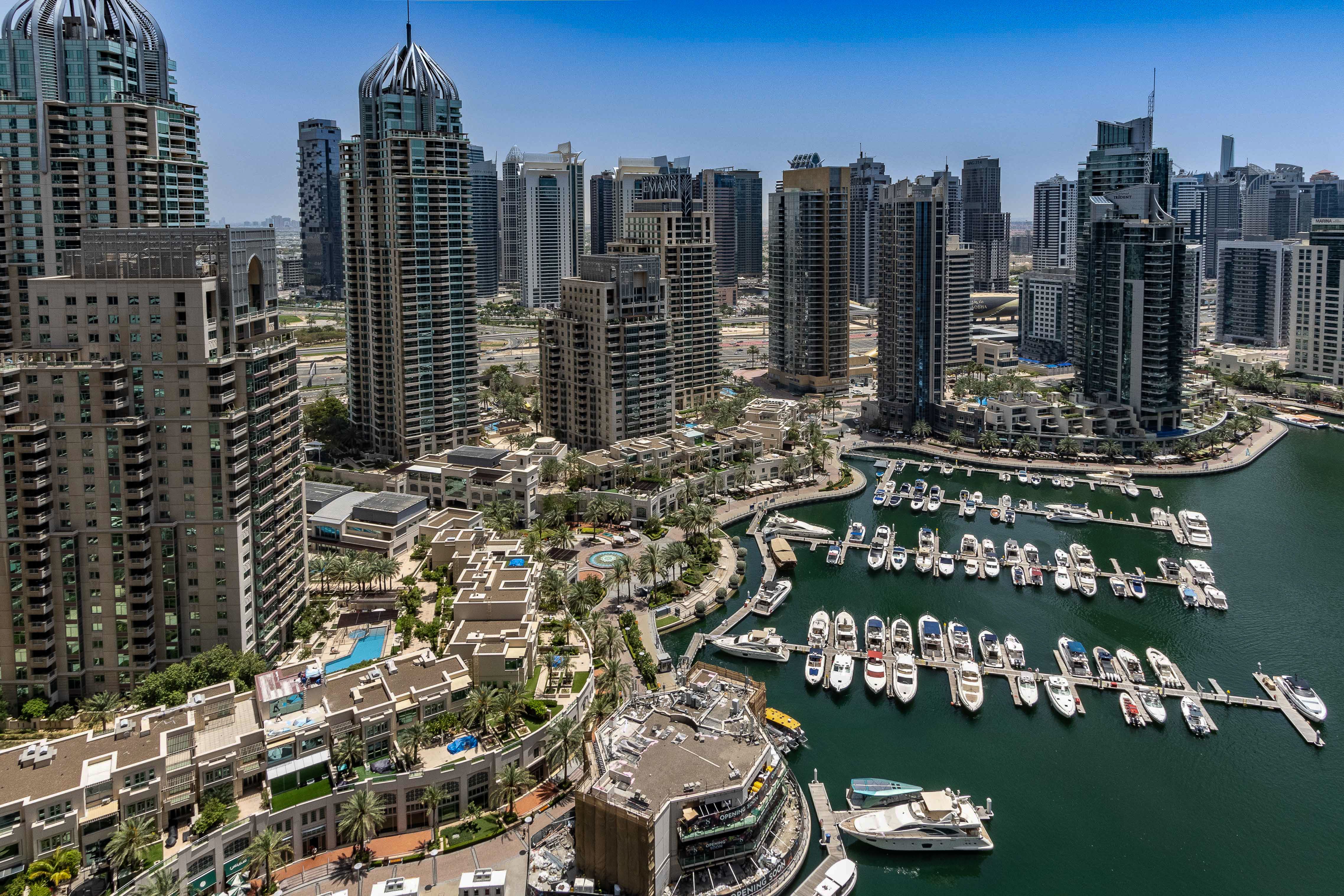 Dubai Marina Skyline with High-Rise Buildings and Yachts · Free Stock Photo