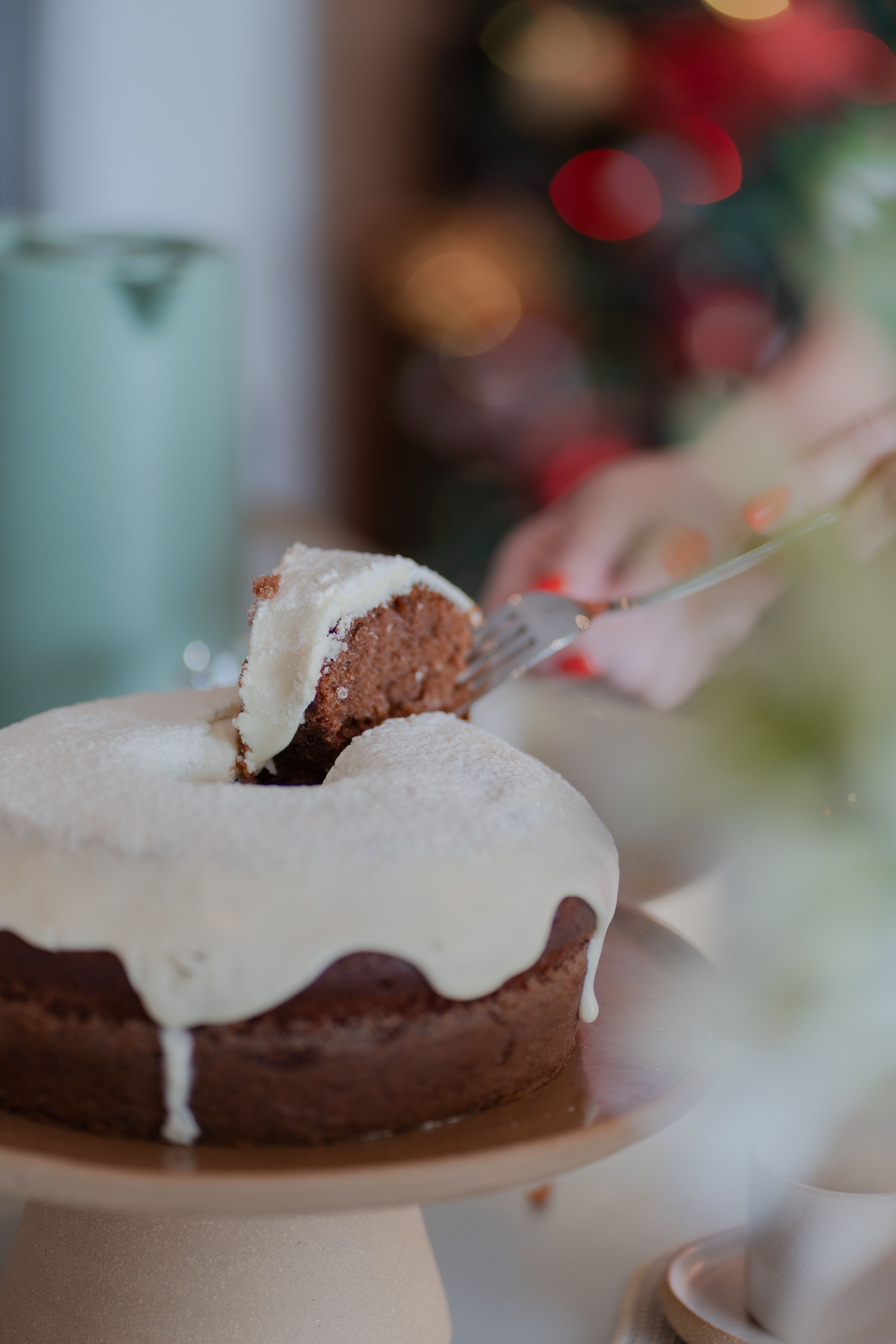Icing Drizzled Cake Being Sliced · Free Stock Photo