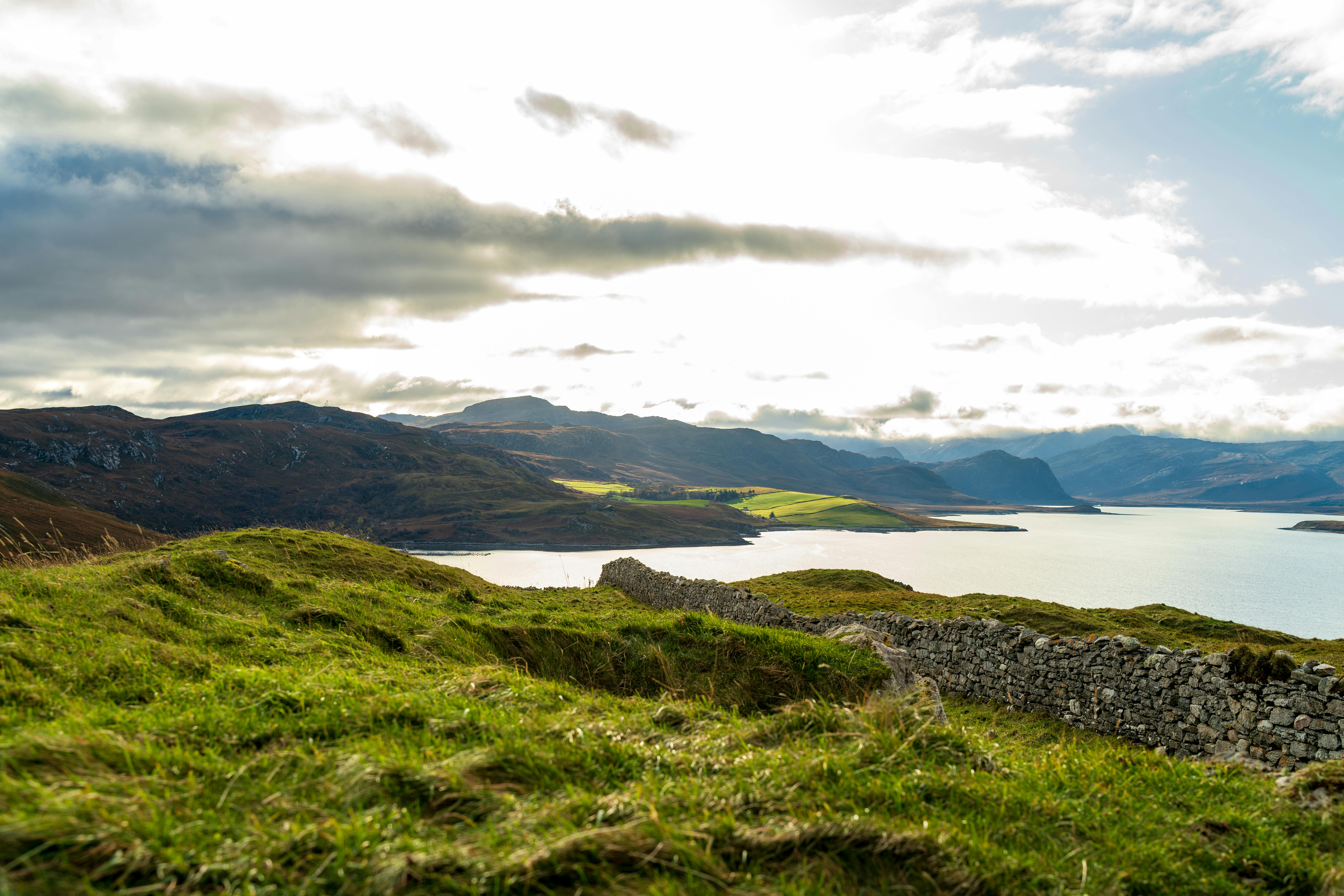 Scenic Highland Landscape with Stone Wall · Free Stock Photo