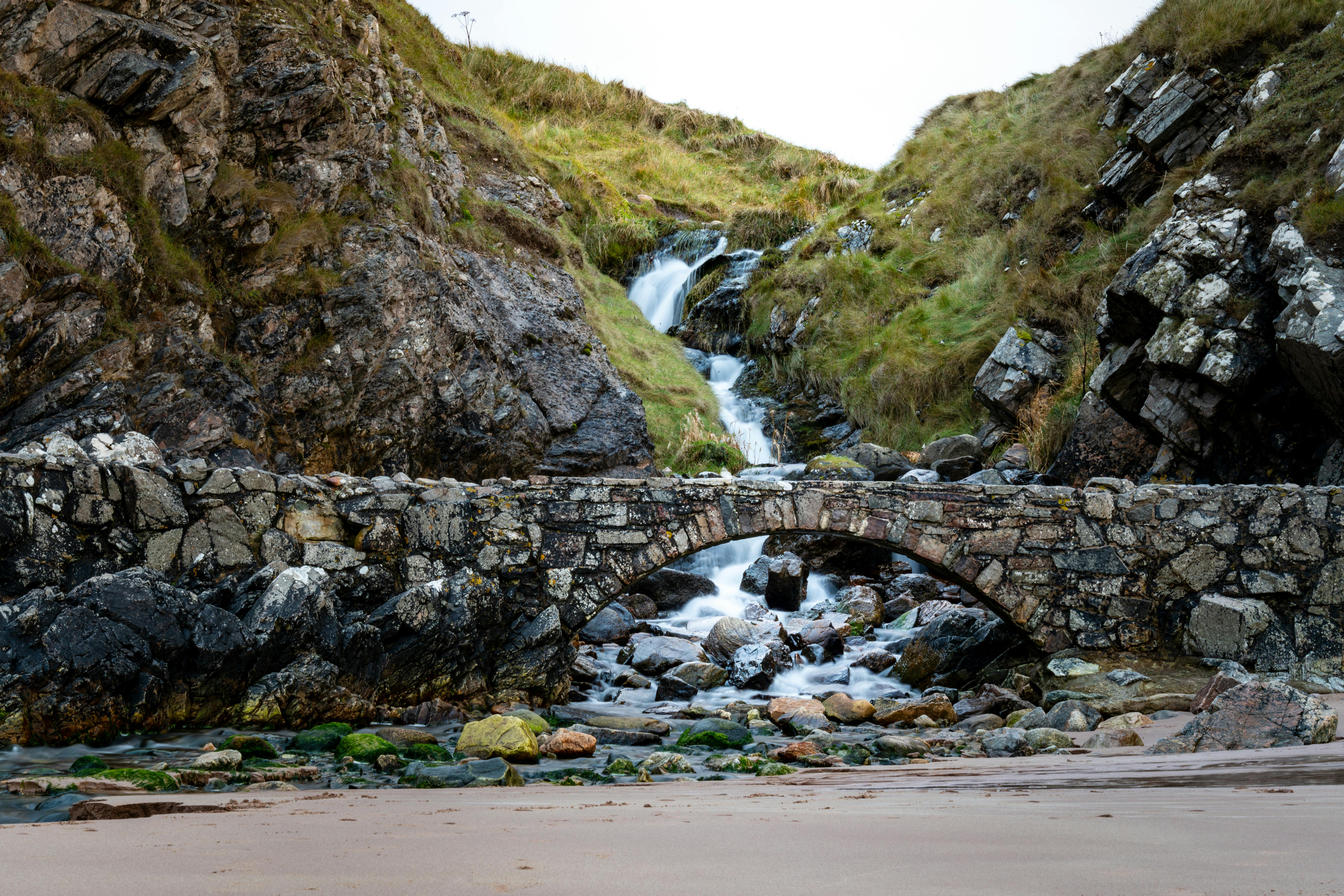 Scenic Stone Bridge Over Flowing Stream · Free Stock Photo