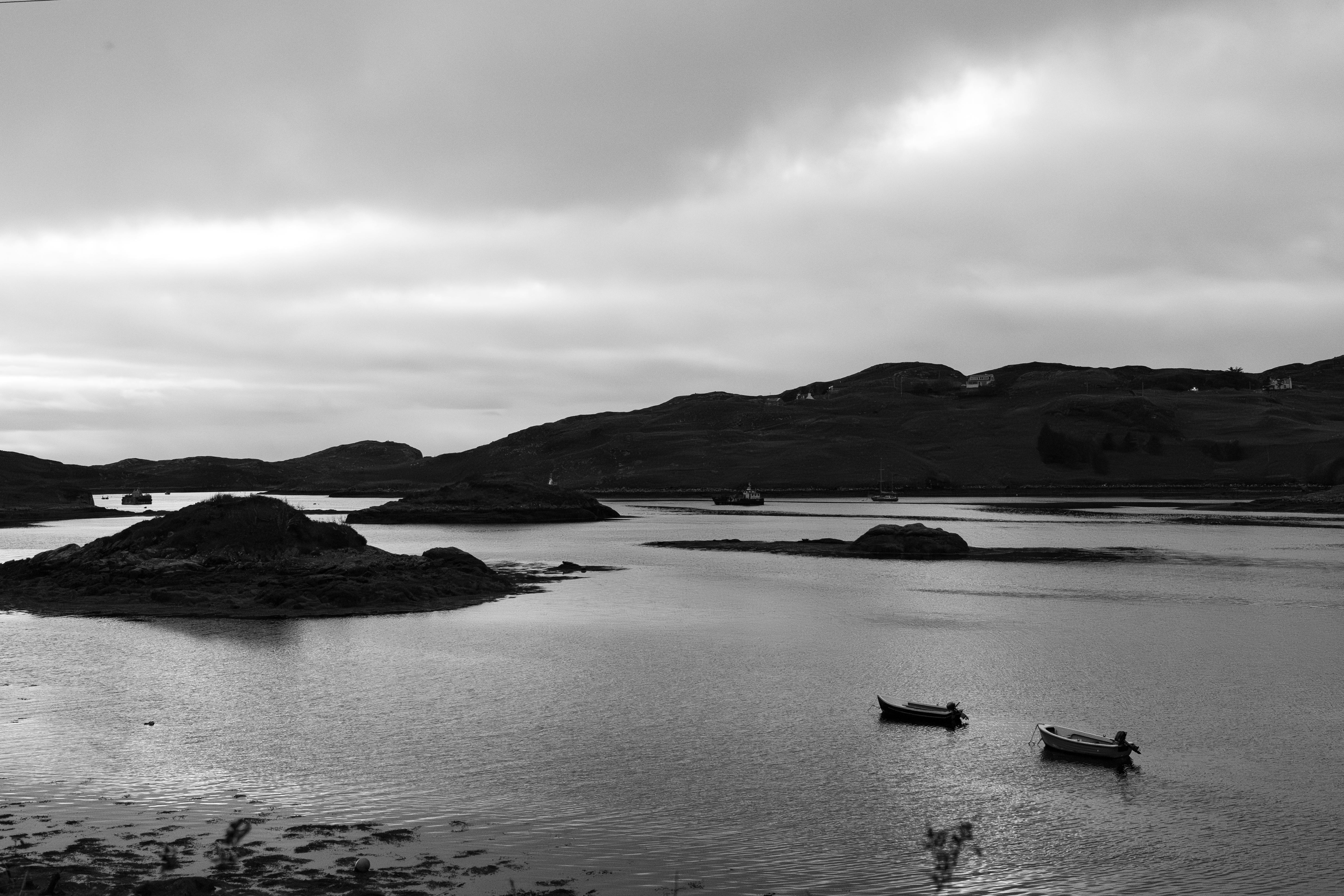 Black and White Coastal Landscape with Boats · Free Stock Photo