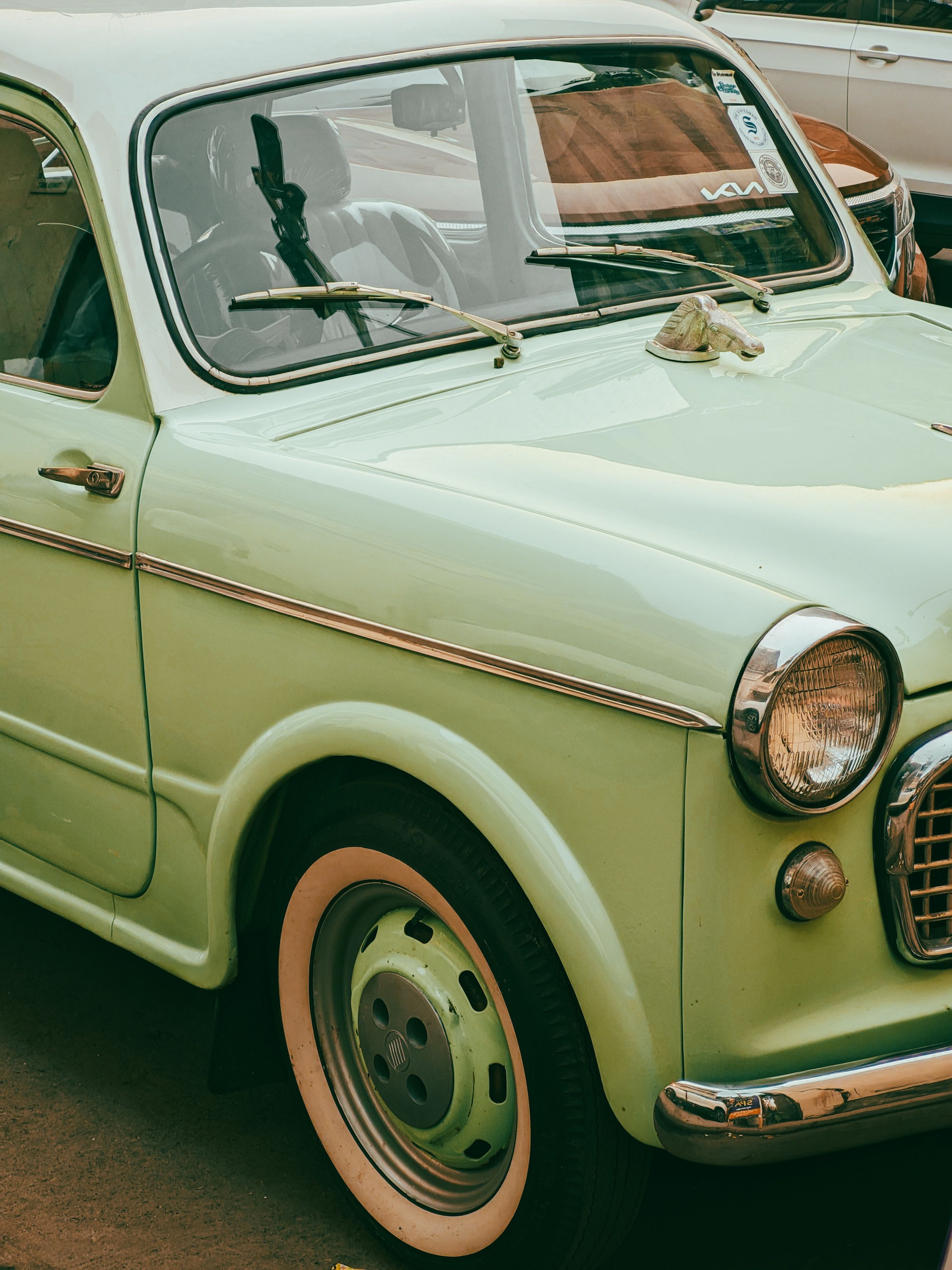 Vintage Mint Classic Car in Urban Setting · Free Stock Photo