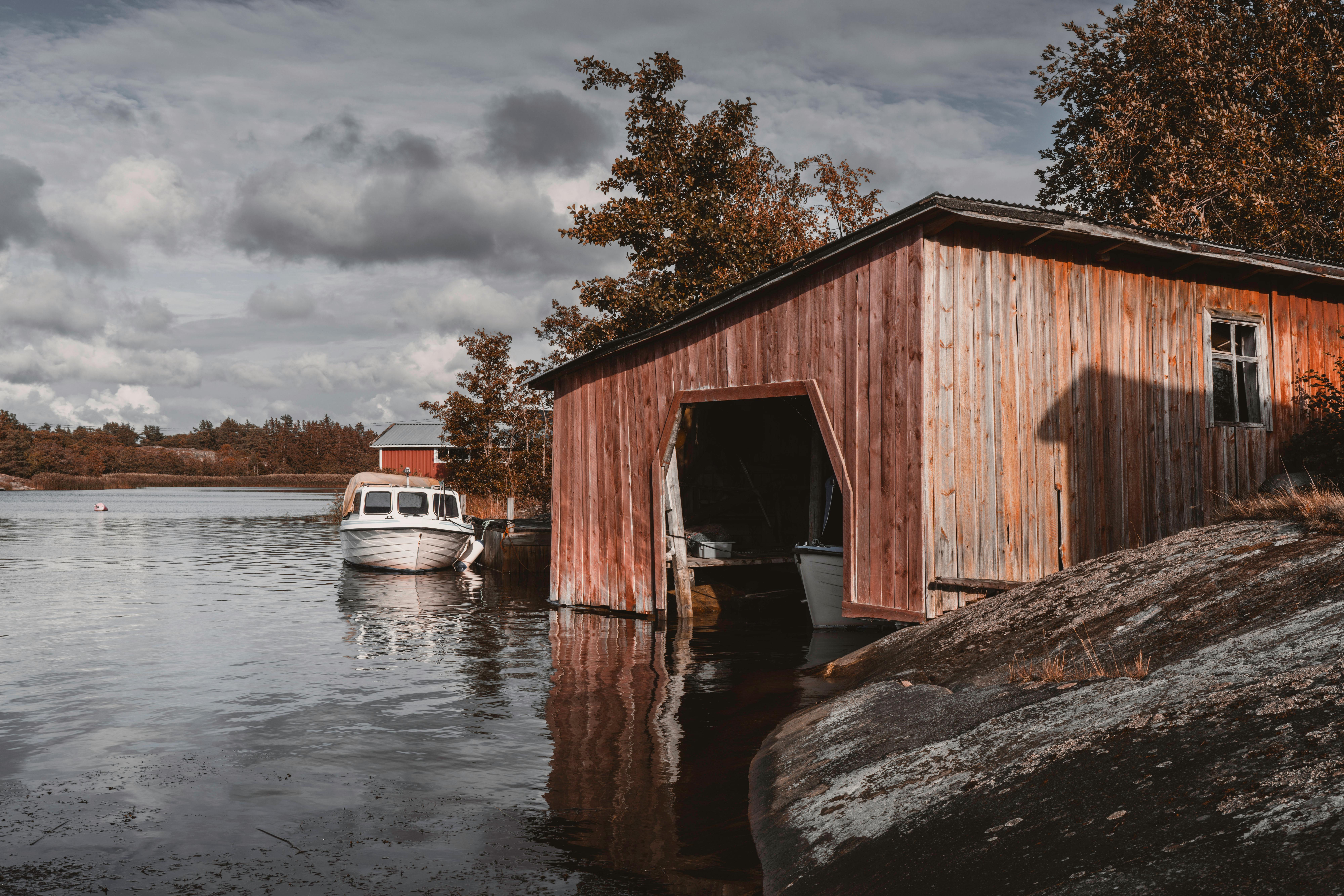 Rustic Boat Shed by Tranquil Scandinavian Waters · Free Stock Photo
