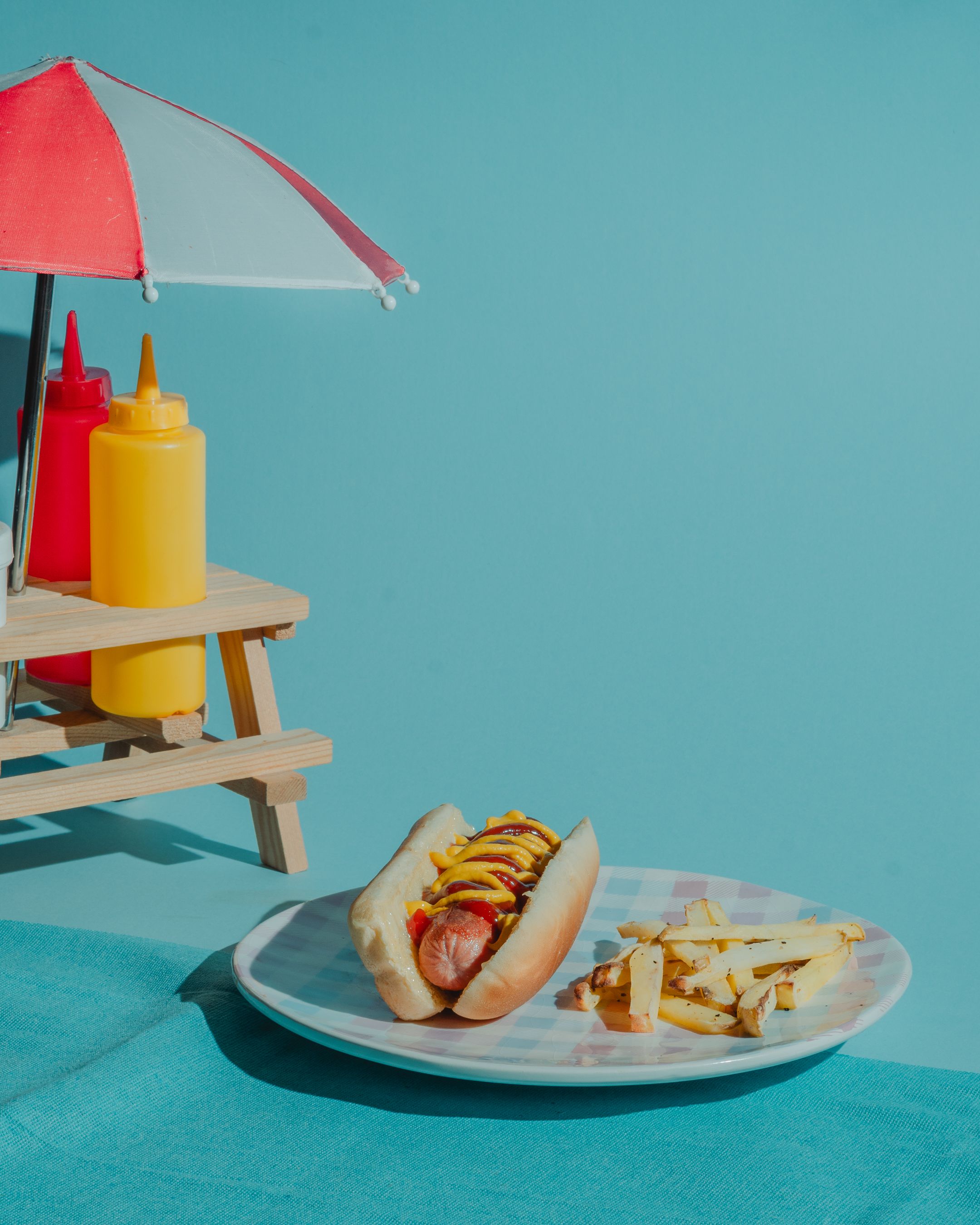 Colorful Picnic Setup with Hot Dog and Fries · Free Stock Photo