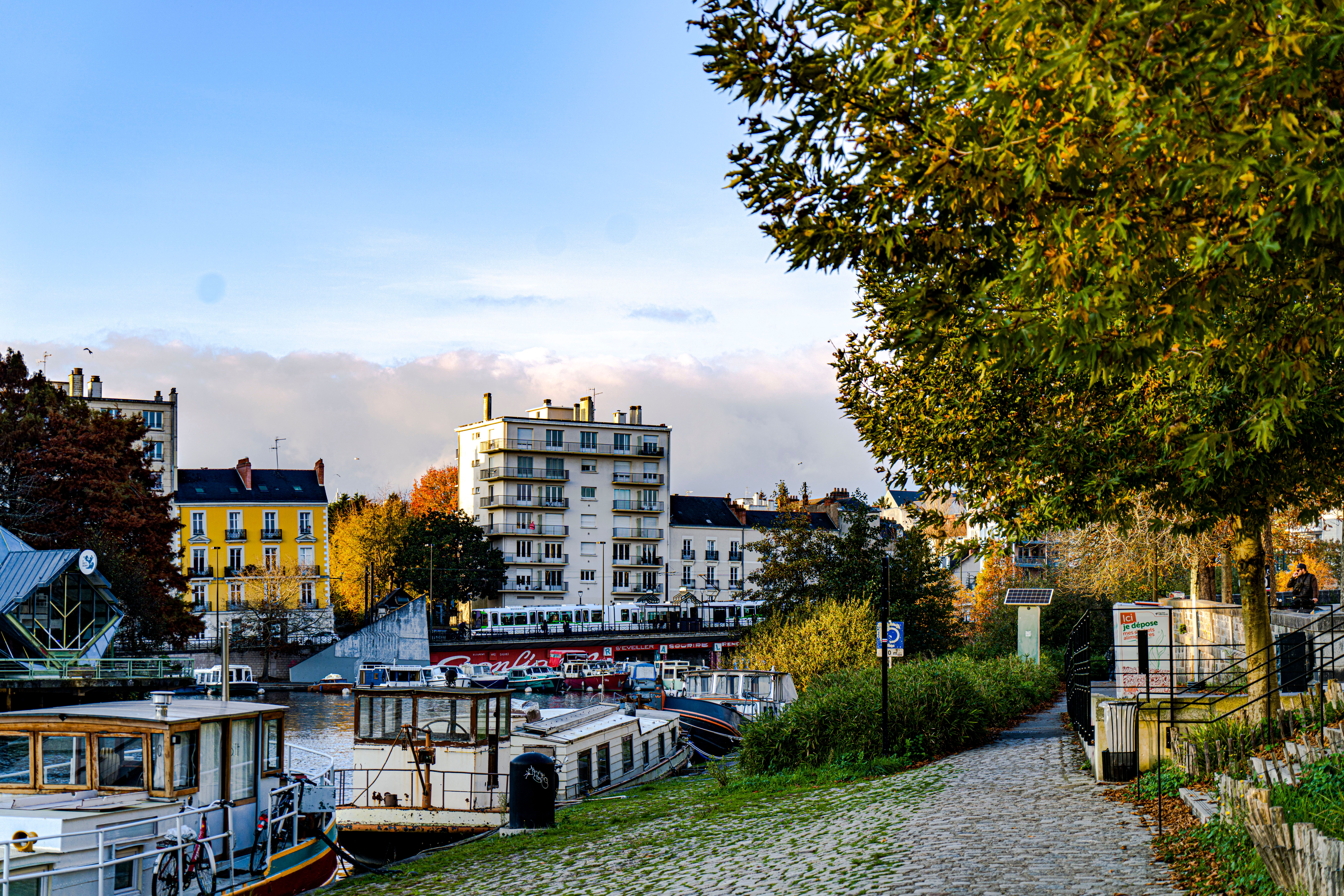 Scenic view of boats and architecture in Nantes · Free Stock Photo