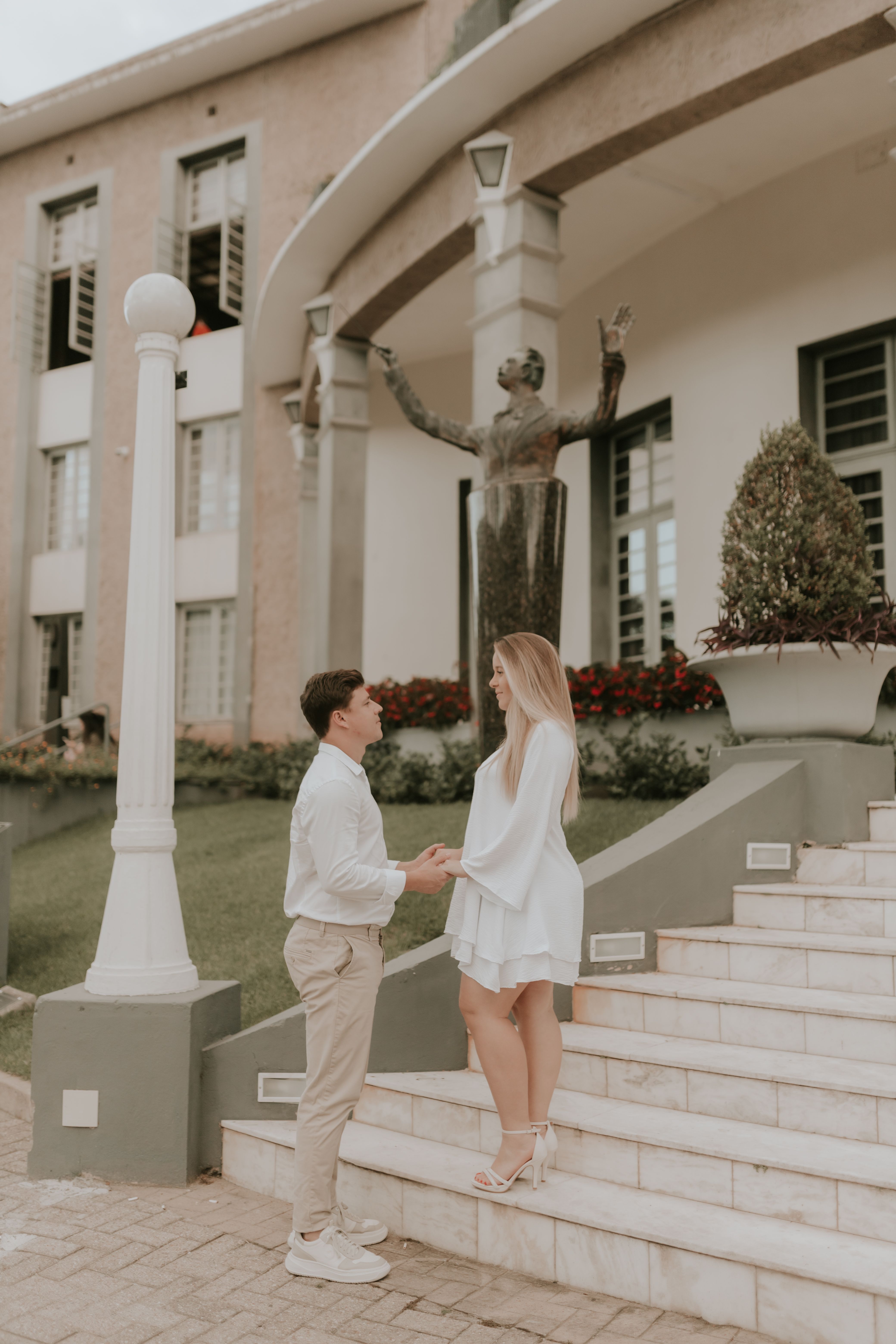 Romantic Couple on Elegant Building Steps · Free Stock Photo
