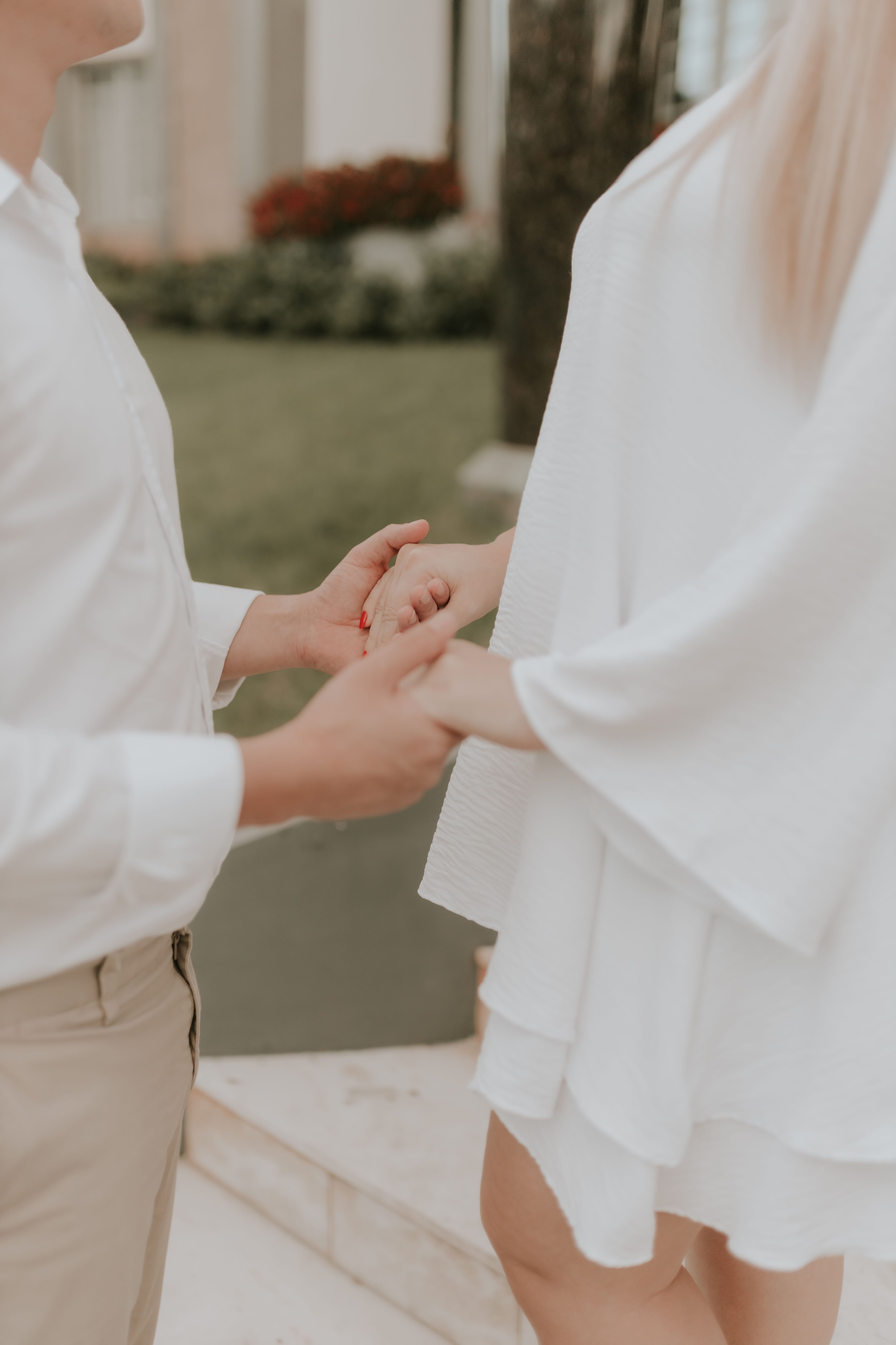 Romantic Couple Holding Hands Outdoors · Free Stock Photo