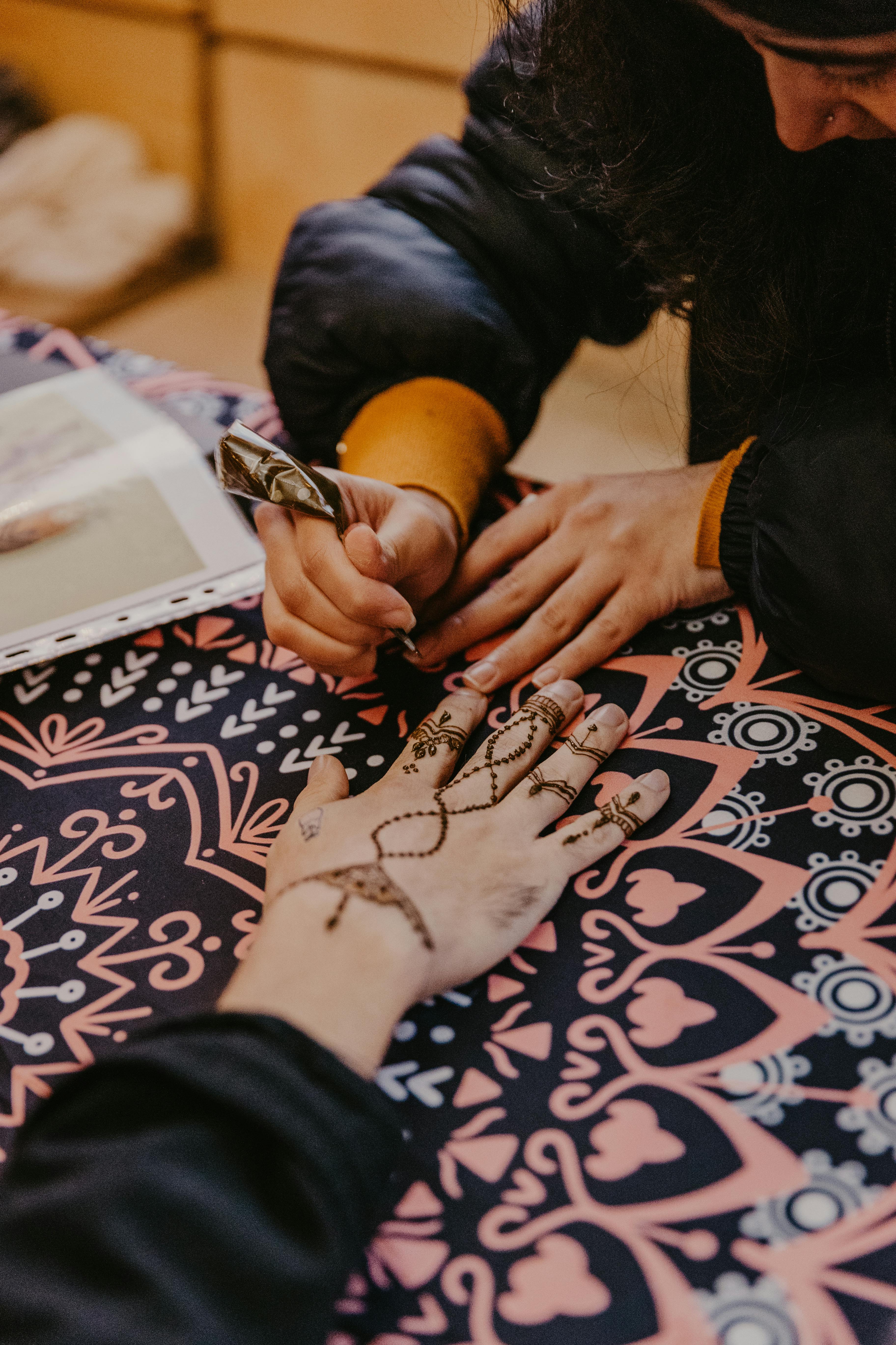 Intricate Henna Design Being Applied in Berlin · Free Stock Photo