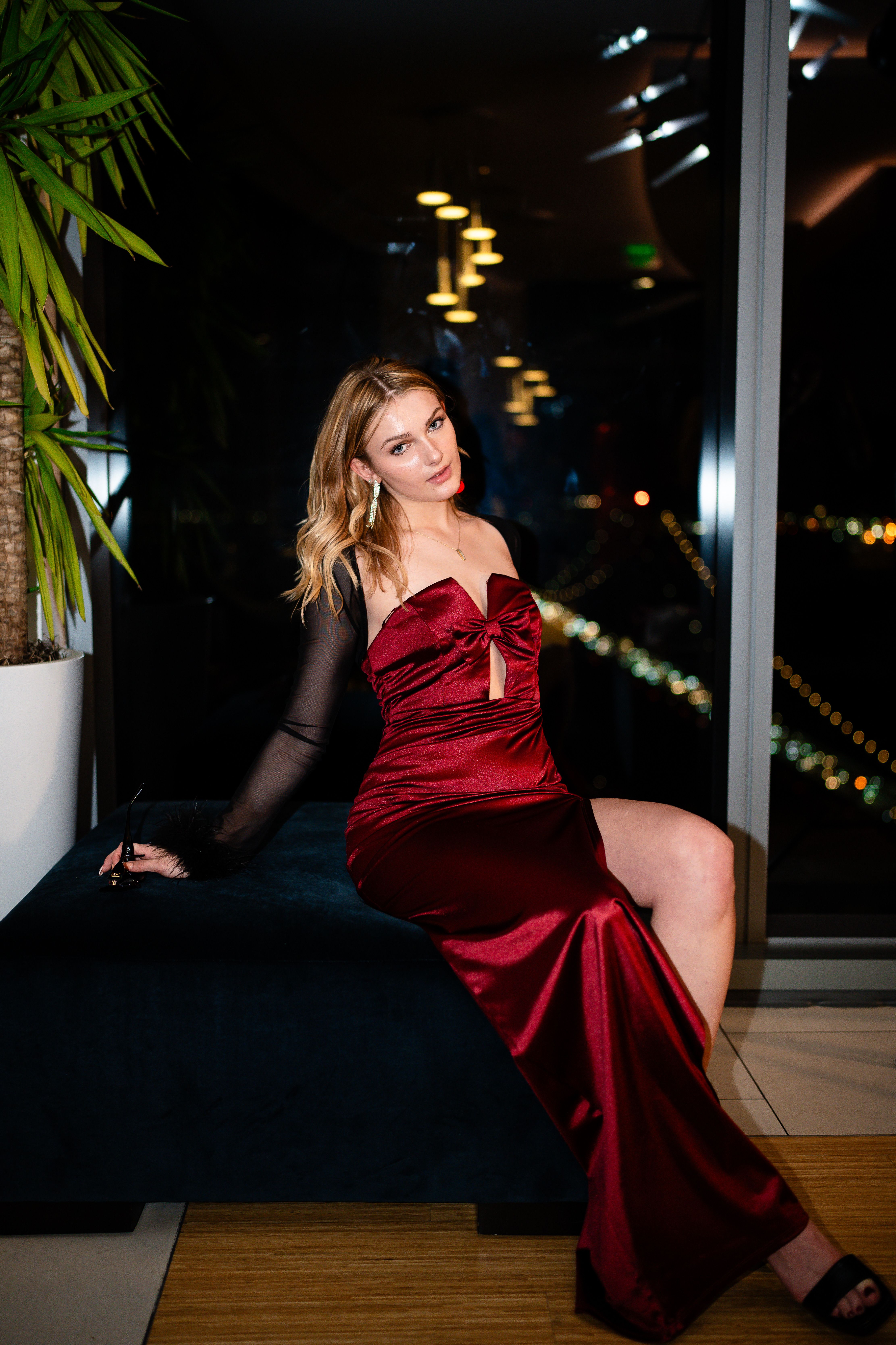 Elegant Woman in Red Evening Dress at Night Event · Free Stock Photo