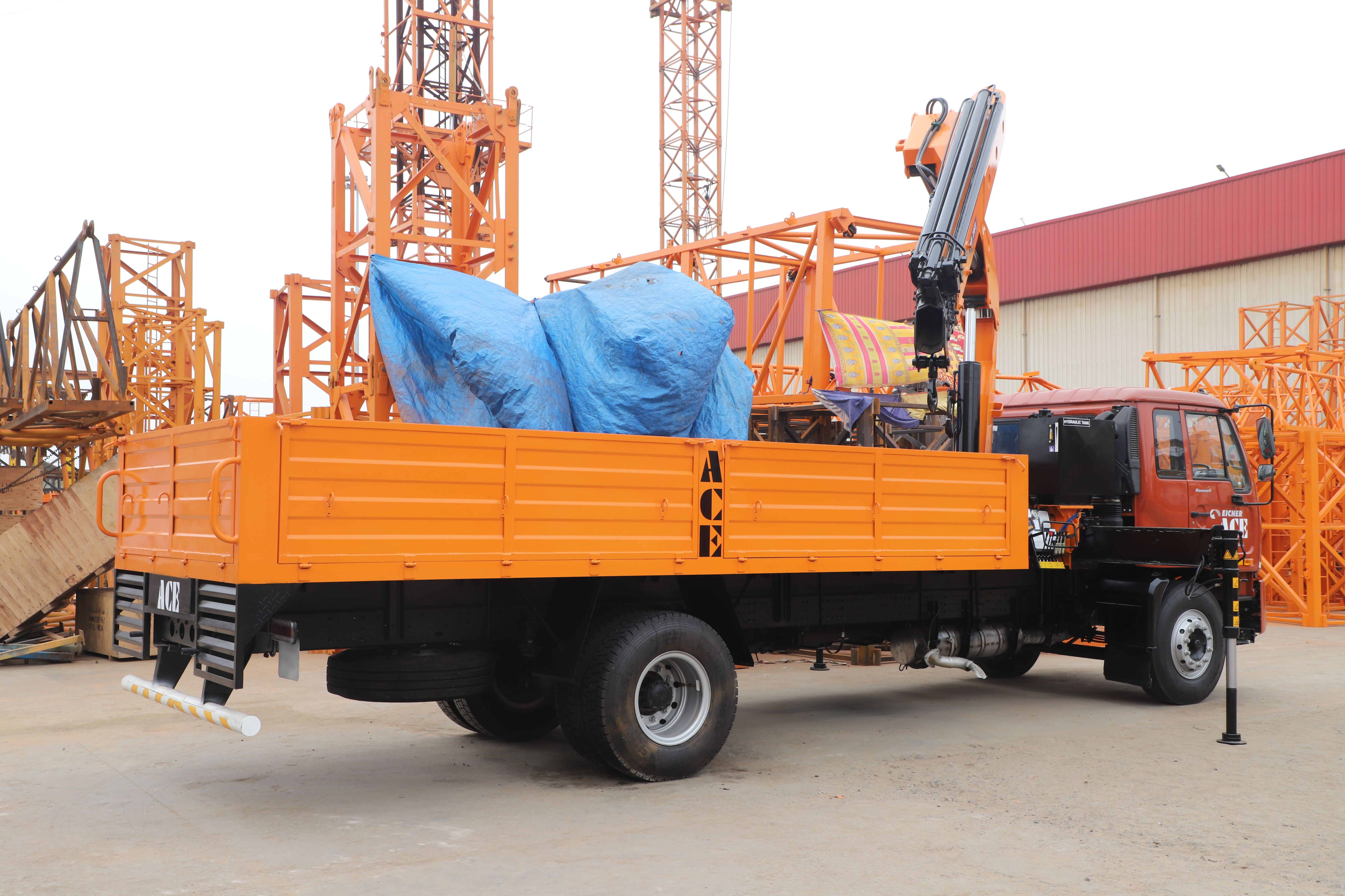 Industrial Truck with Crane in Construction Yard · Free Stock Photo