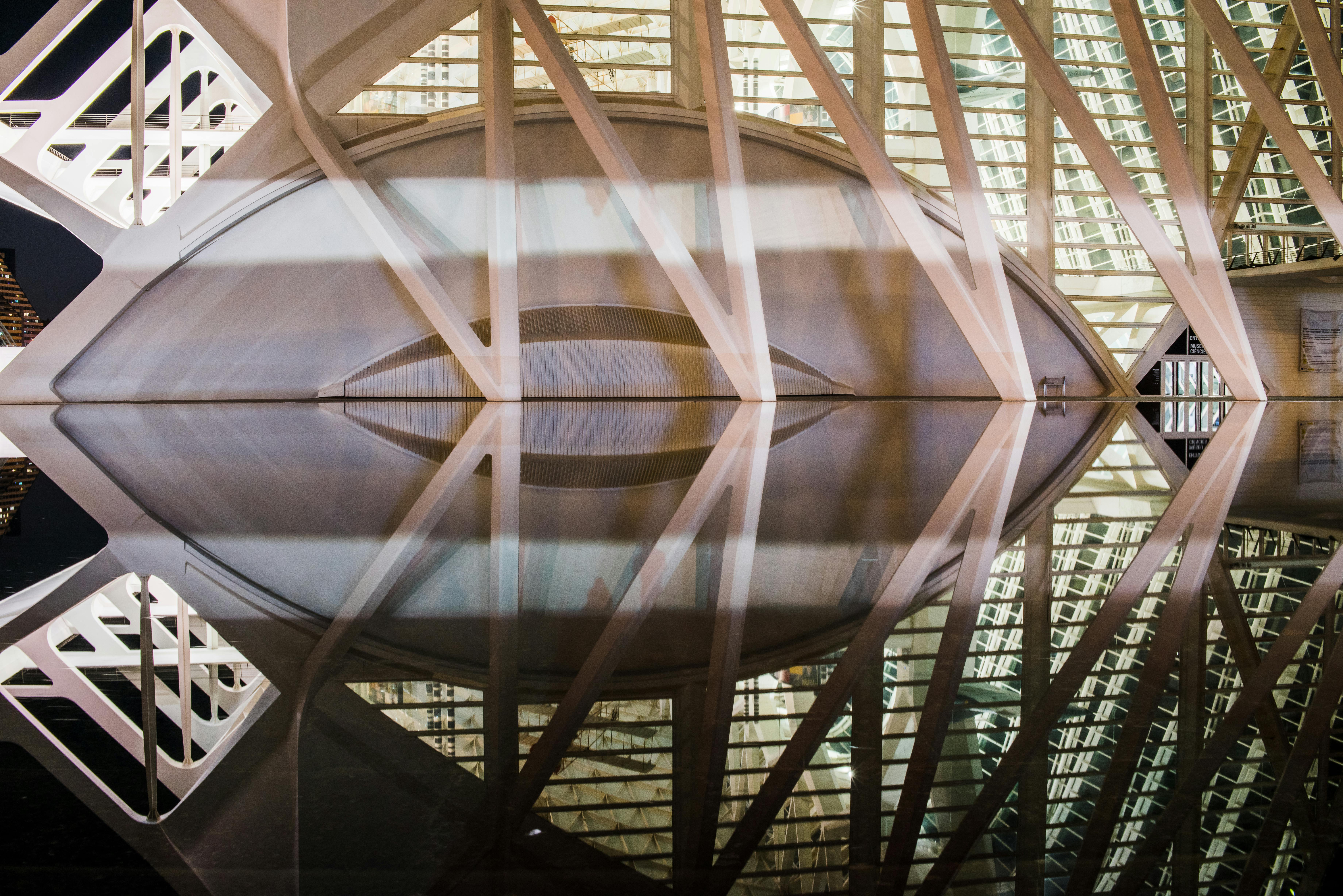Architectural Reflection at Night in Valencia, Spain · Free Stock Photo