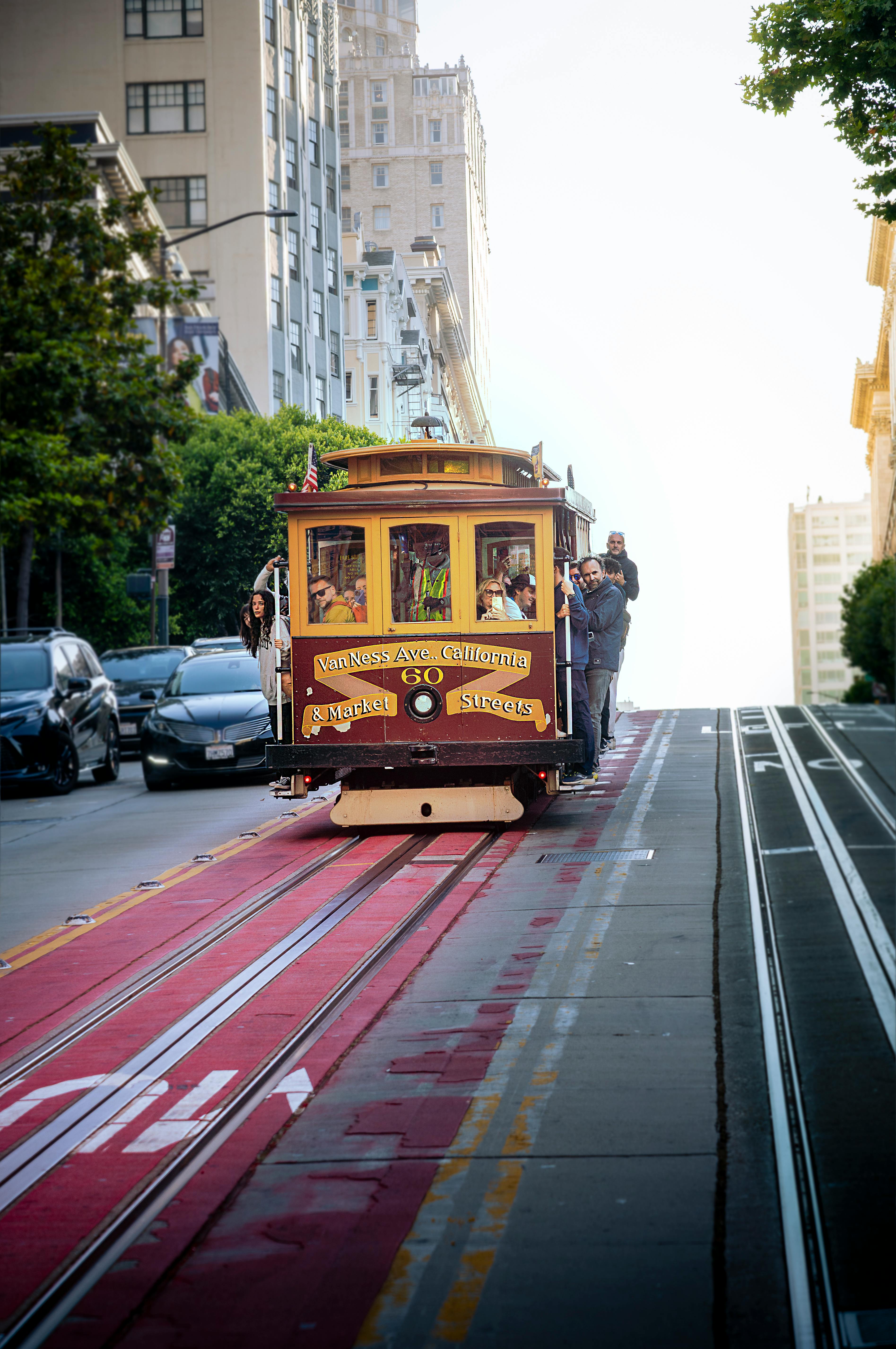 Iconic San Francisco Cable Car on City Street · Free Stock Photo