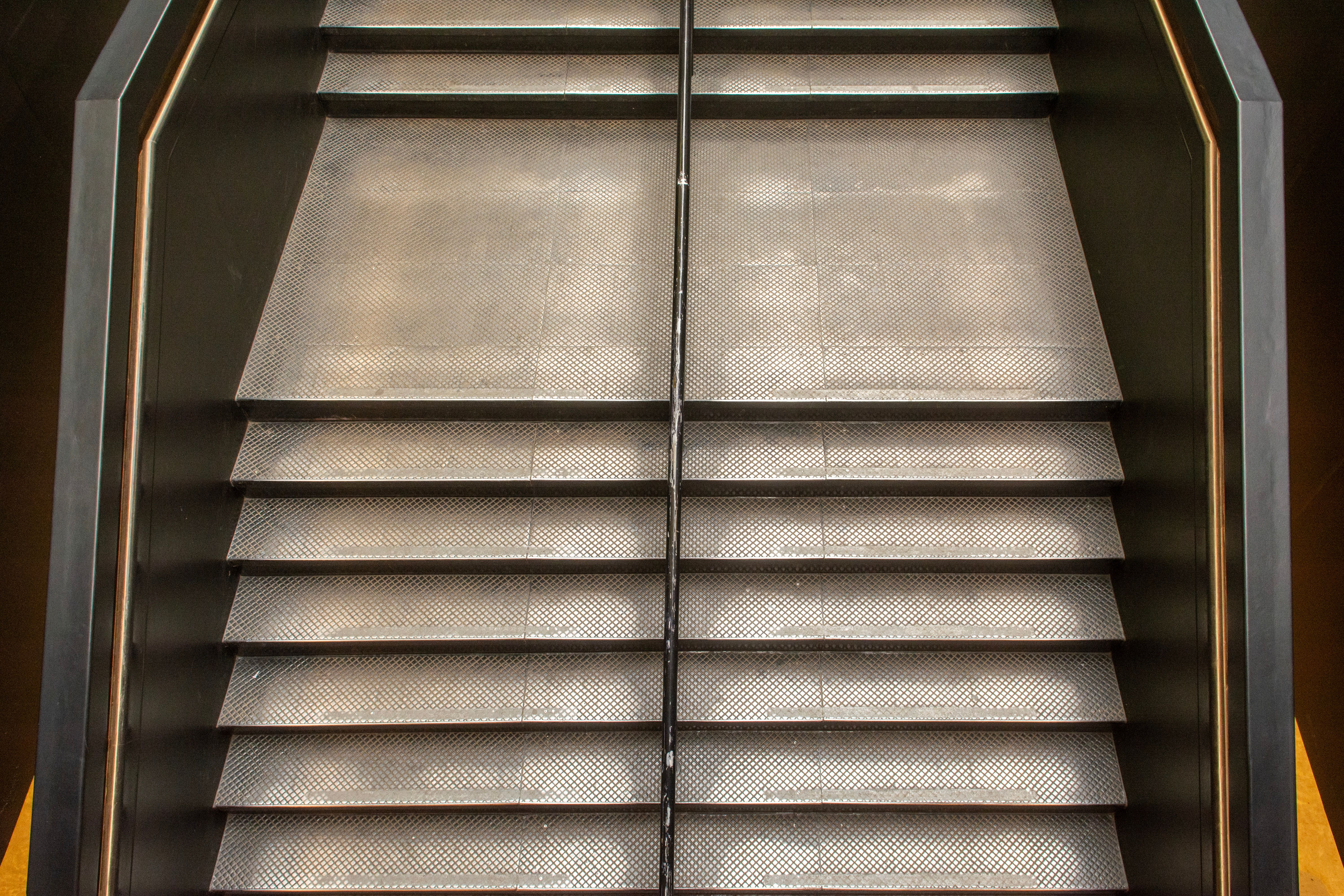 Modern Metallic Staircase with Symmetrical Design · Free Stock Photo