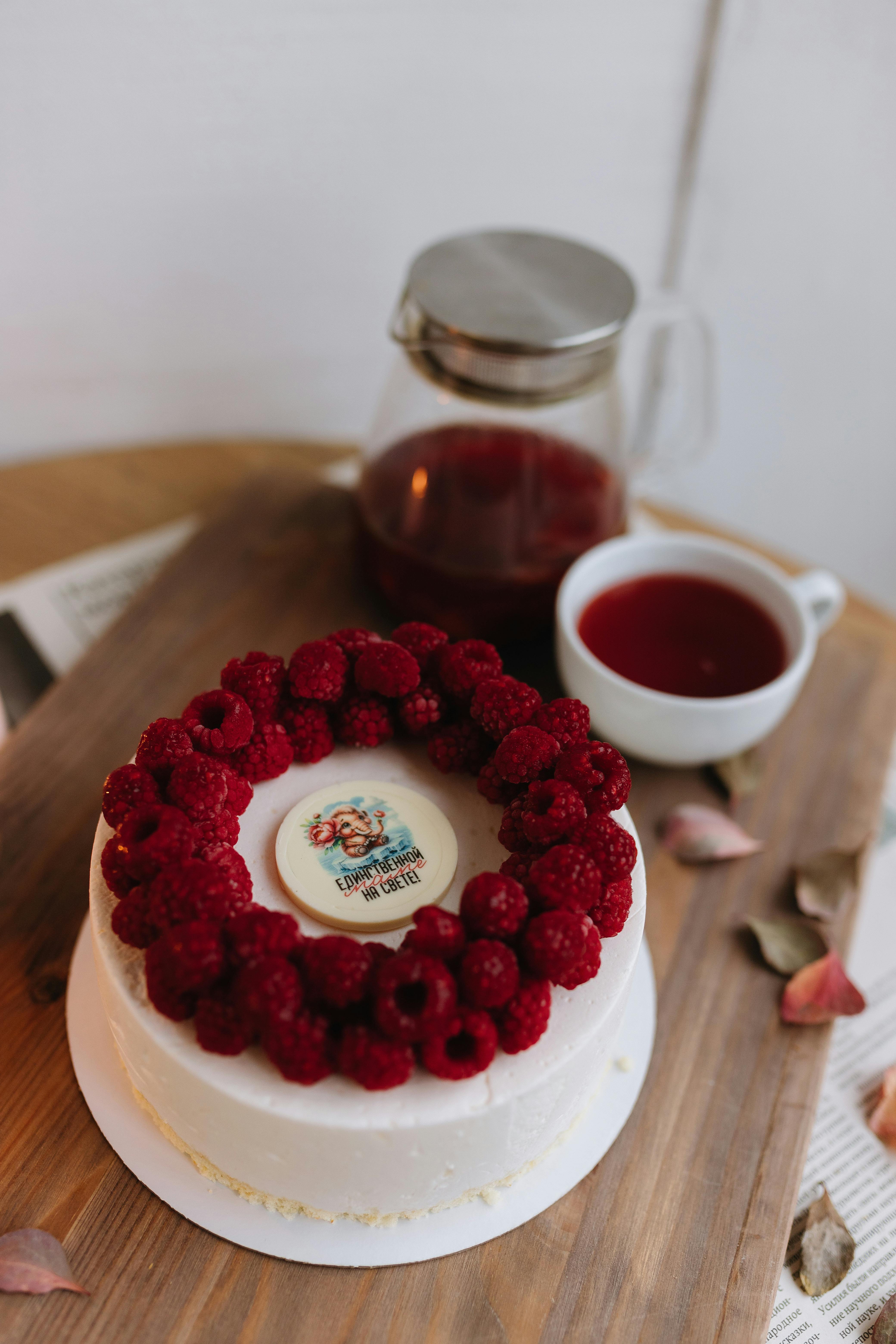 Delicious Raspberry Topped Cake with Teapot · Free Stock Photo