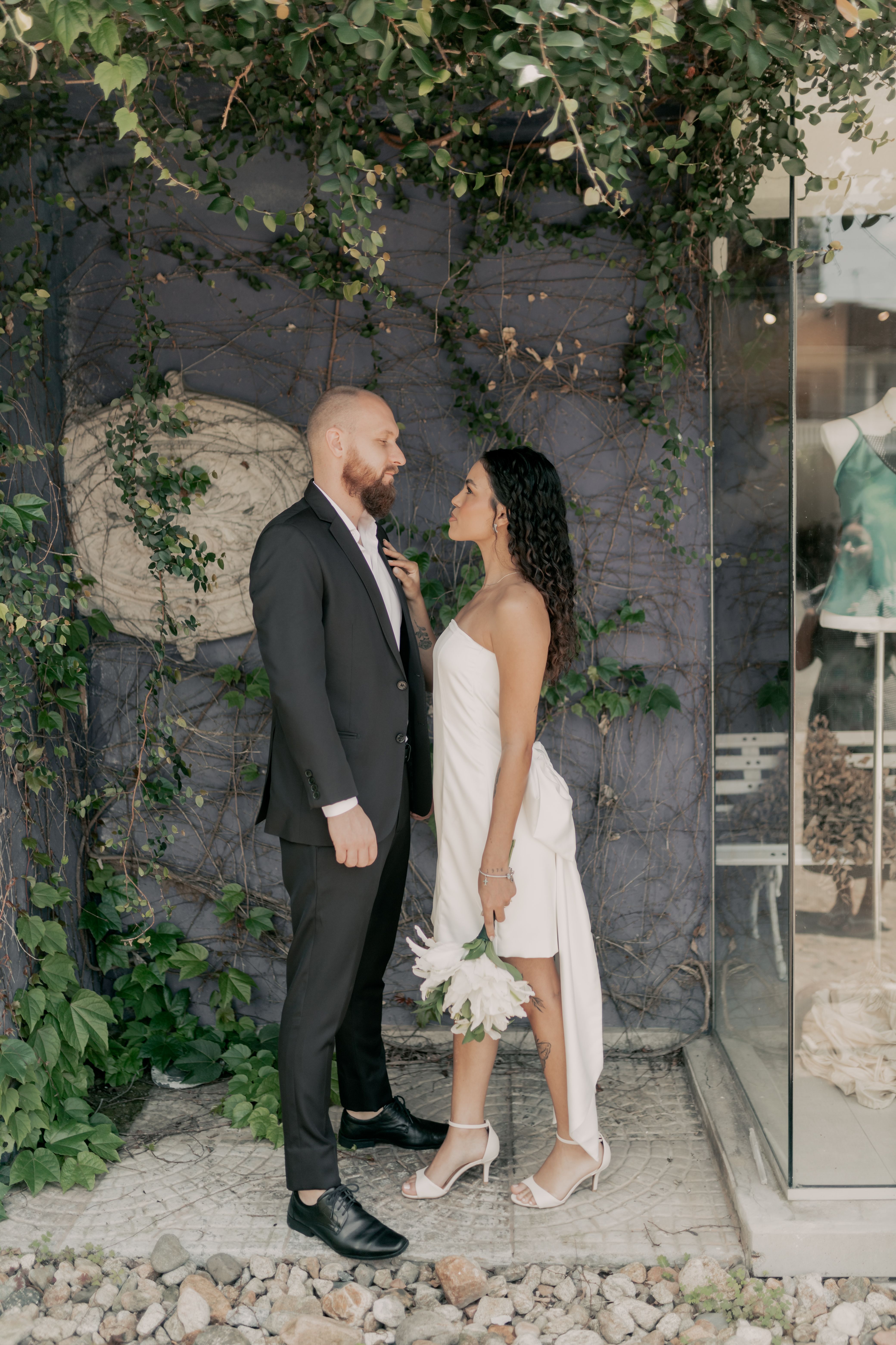 Elegant Couple in Wedding Attire Outdoors · Free Stock Photo