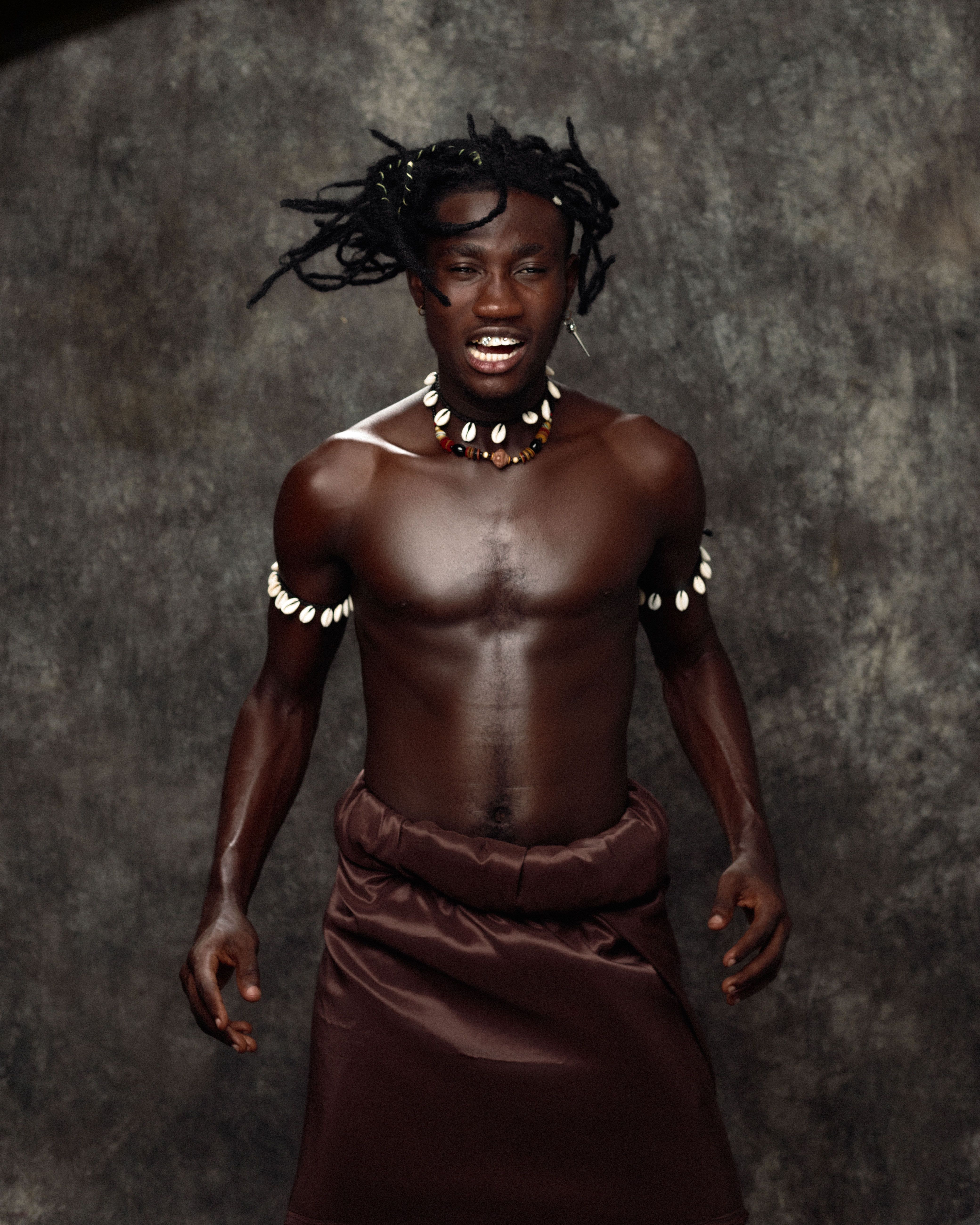 Vibrant Portrait of an African Man in Traditional Attire · Free Stock Photo
