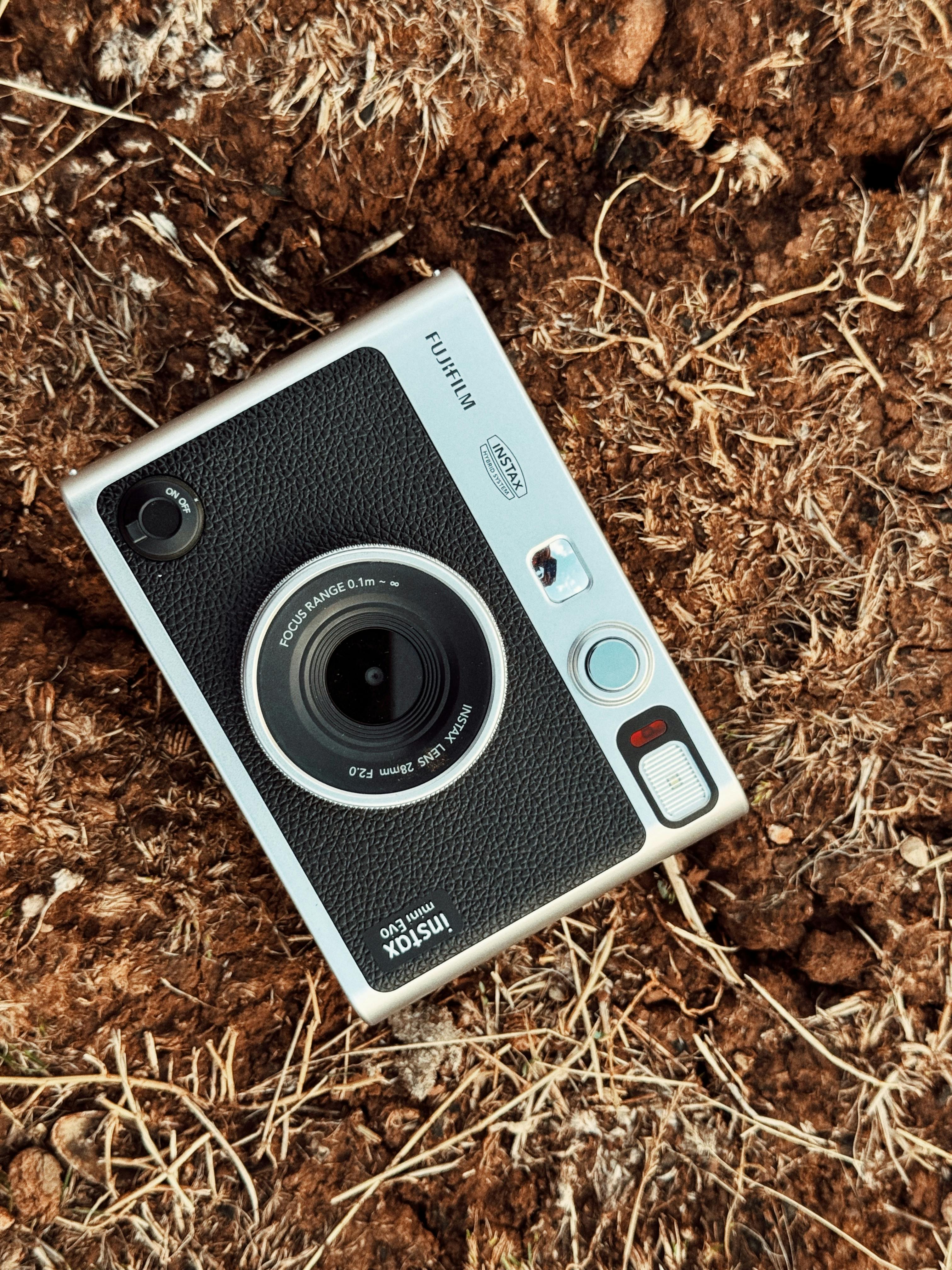 Retro Instax Camera on Earthy Background · Free Stock Photo
