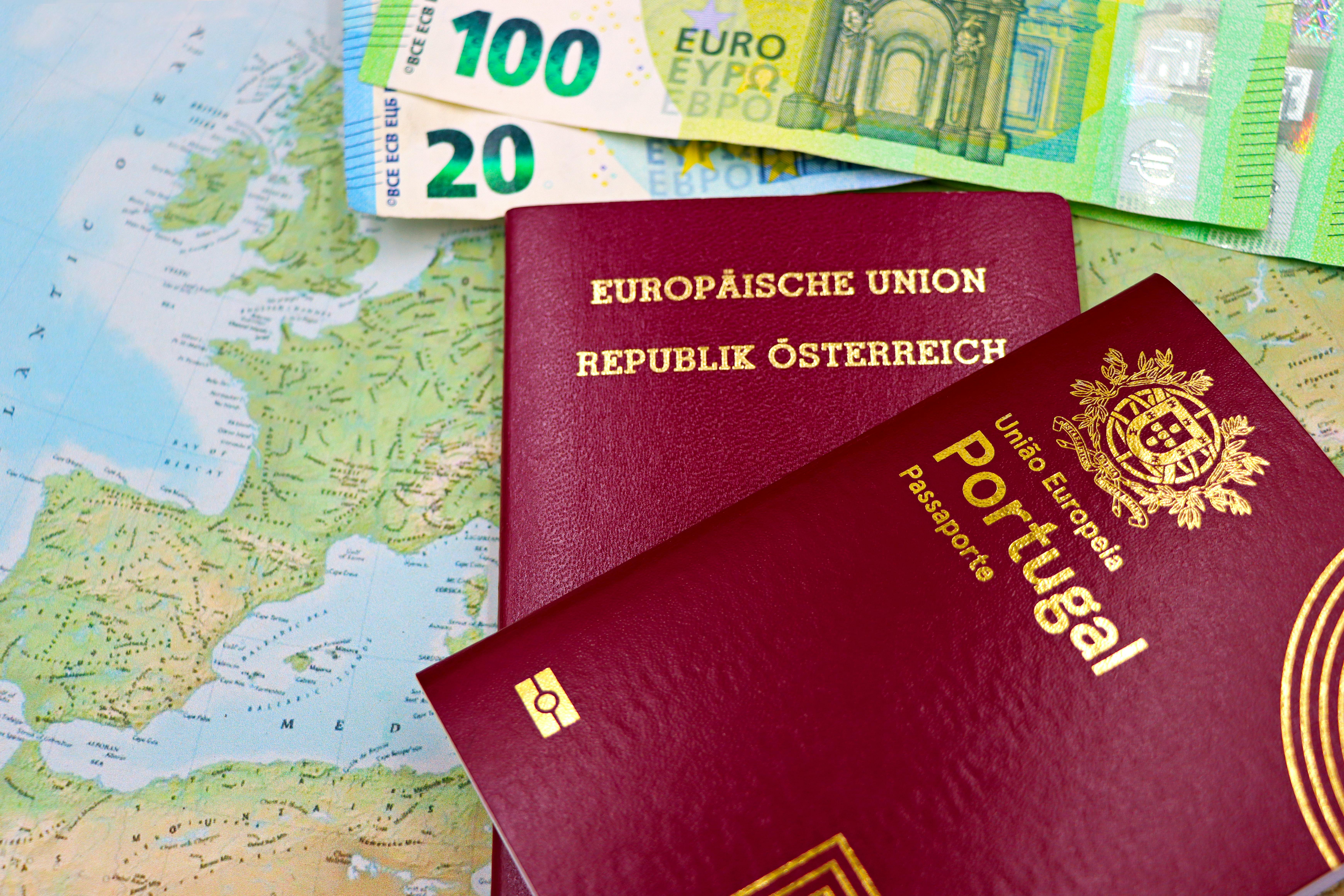 European Passports on Map with Euro Currency · Free Stock Photo