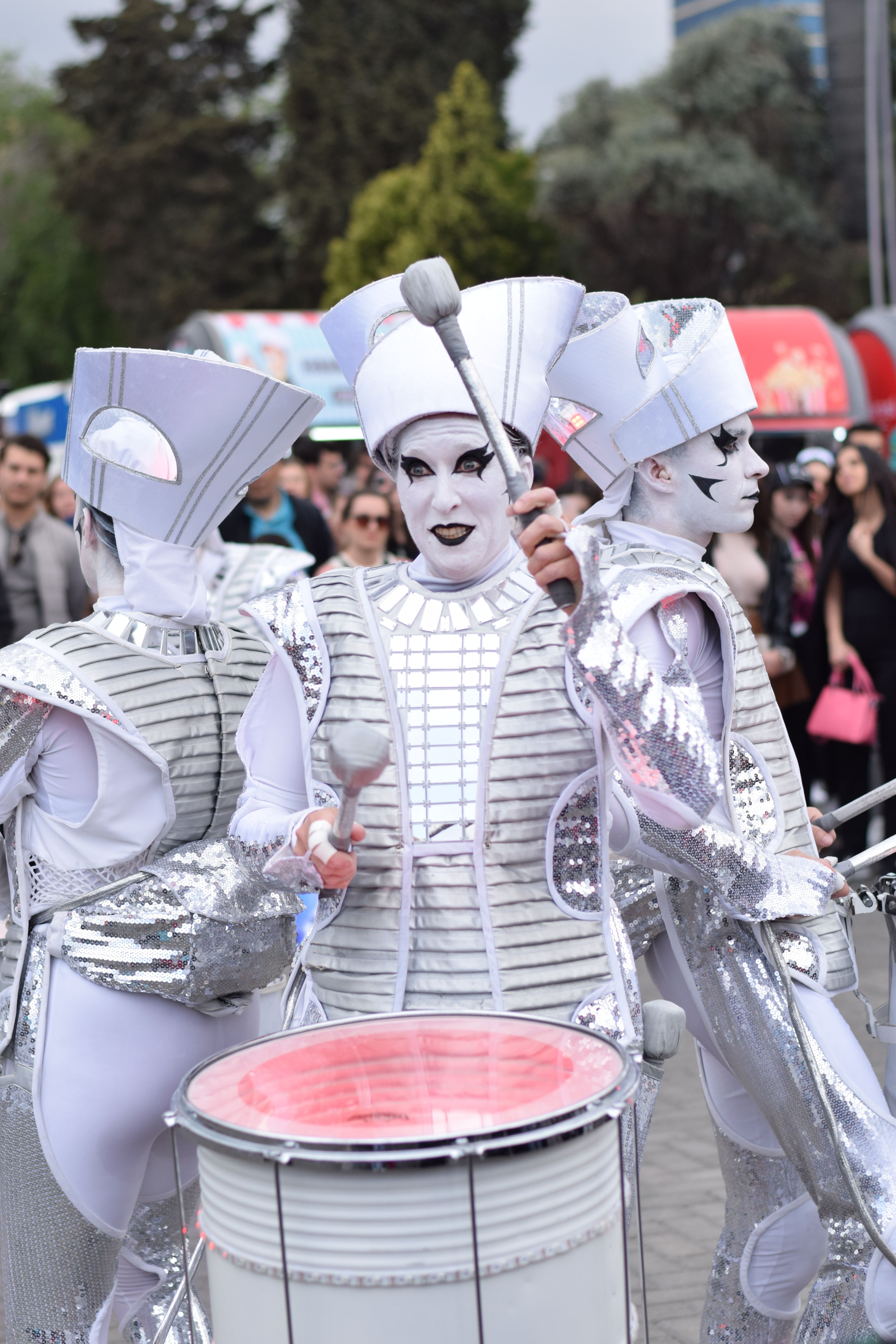 Street Performers in Futuristic Silver Costumes · Free Stock Photo