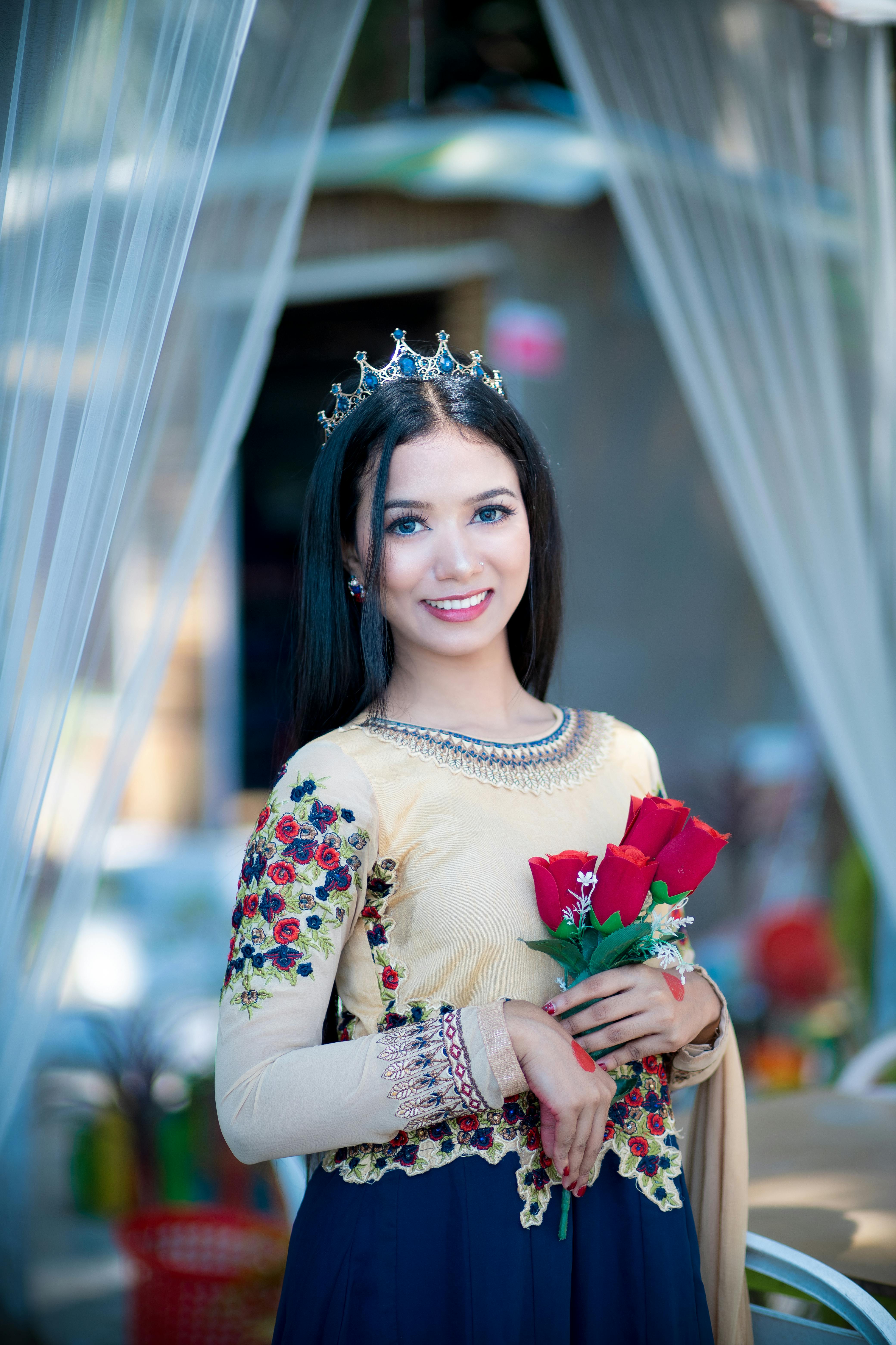 Elegant Woman with Crown and Roses in Bangladesh · Free Stock Photo