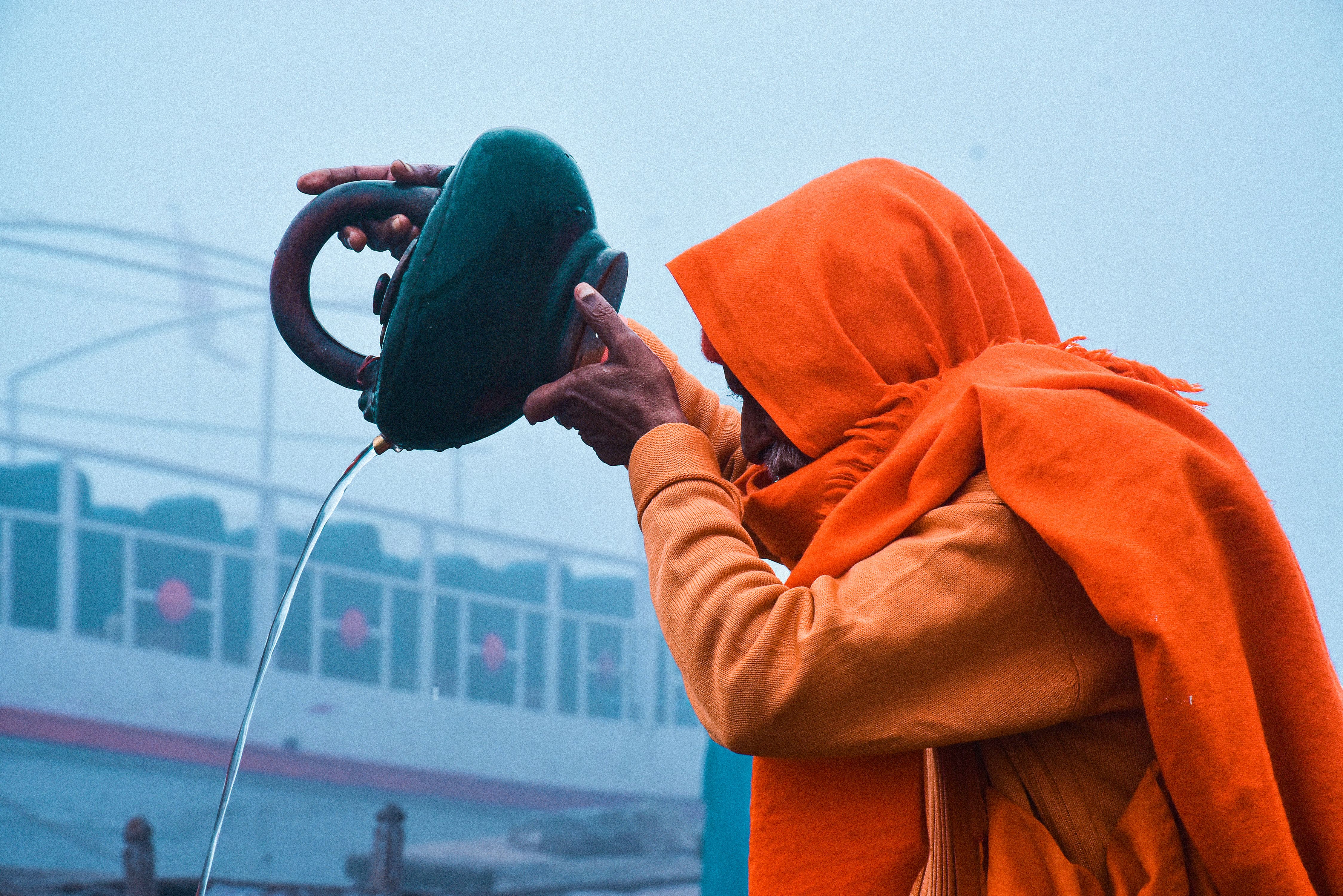 Hindu Monk Performing Ritual on Ganges River · Free Stock Photo