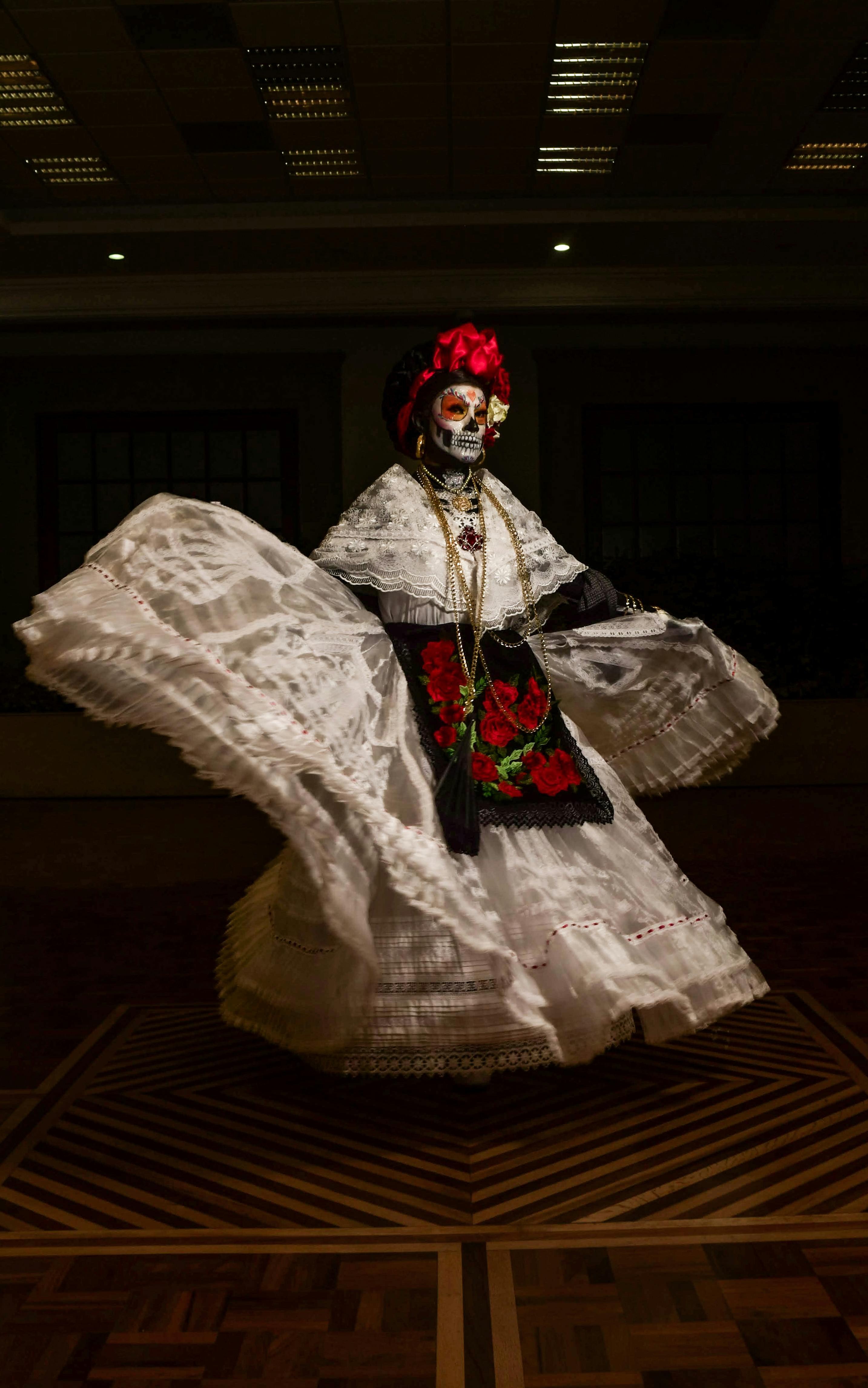 Vibrant Traditional Day of the Dead Dancer · Free Stock Photo