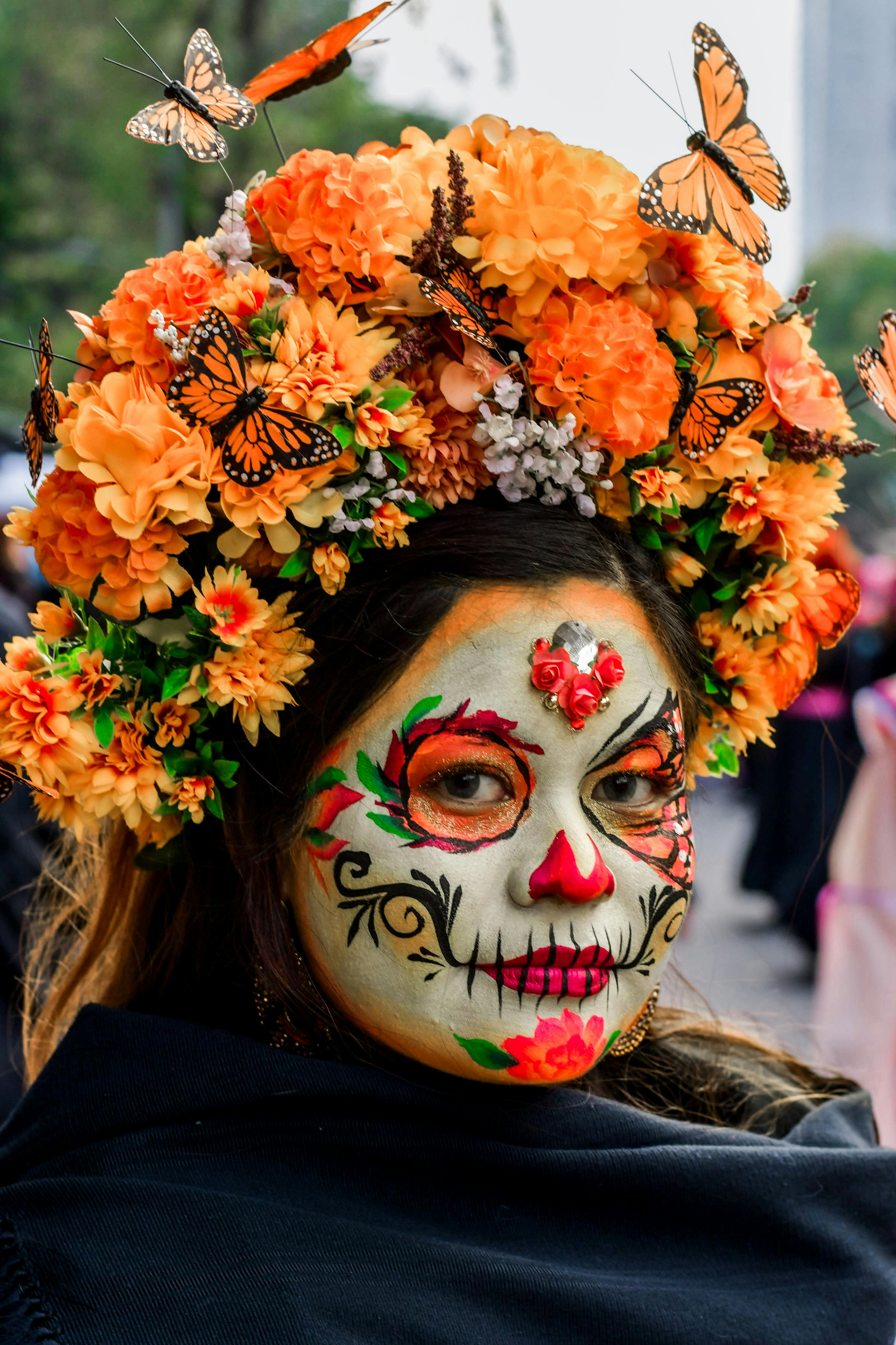 Day of the Dead Face Paint with Floral Crown · Free Stock Photo