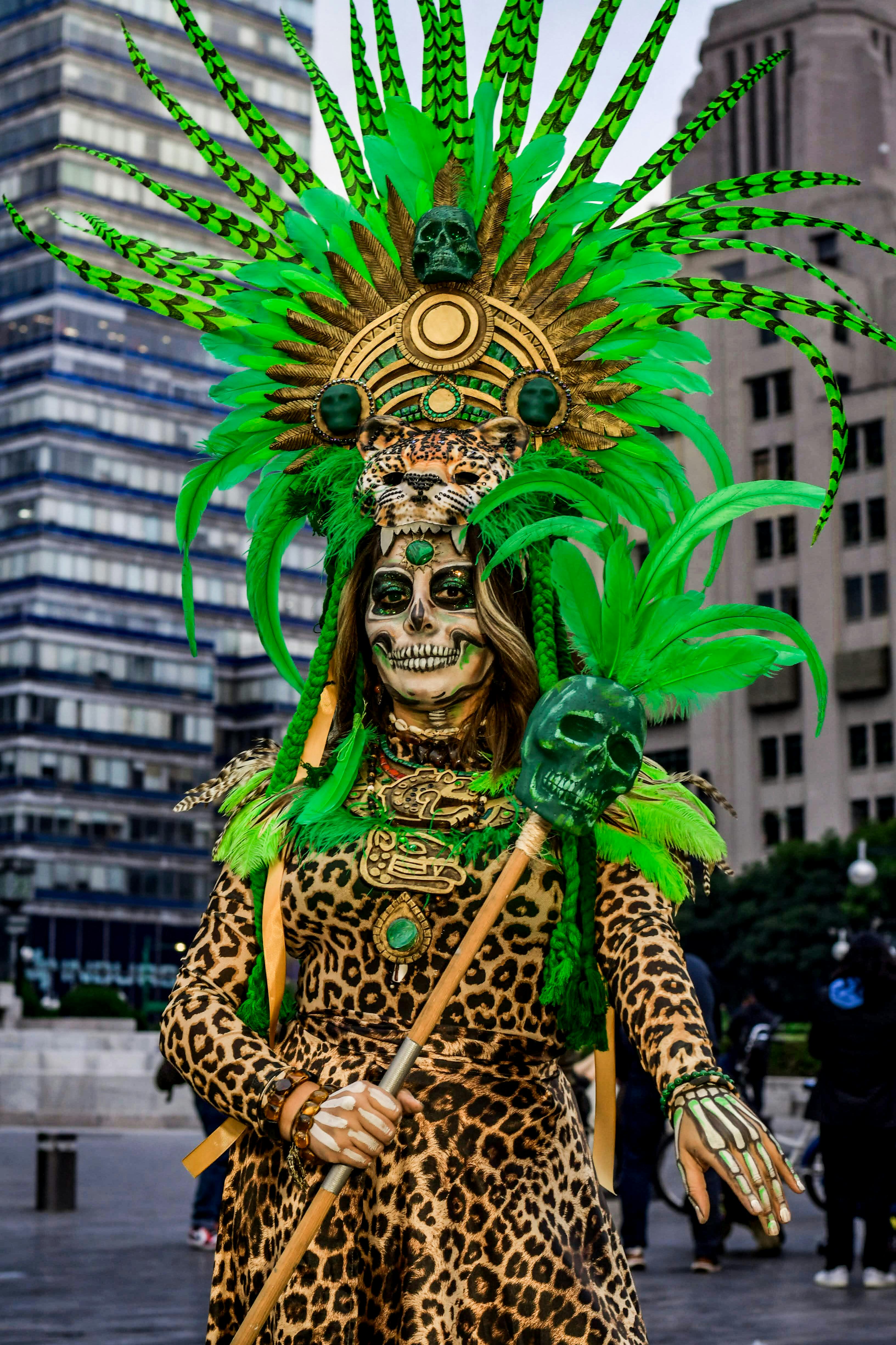 Vibrant Aztec Costume Celebration in Urban Setting · Free Stock Photo