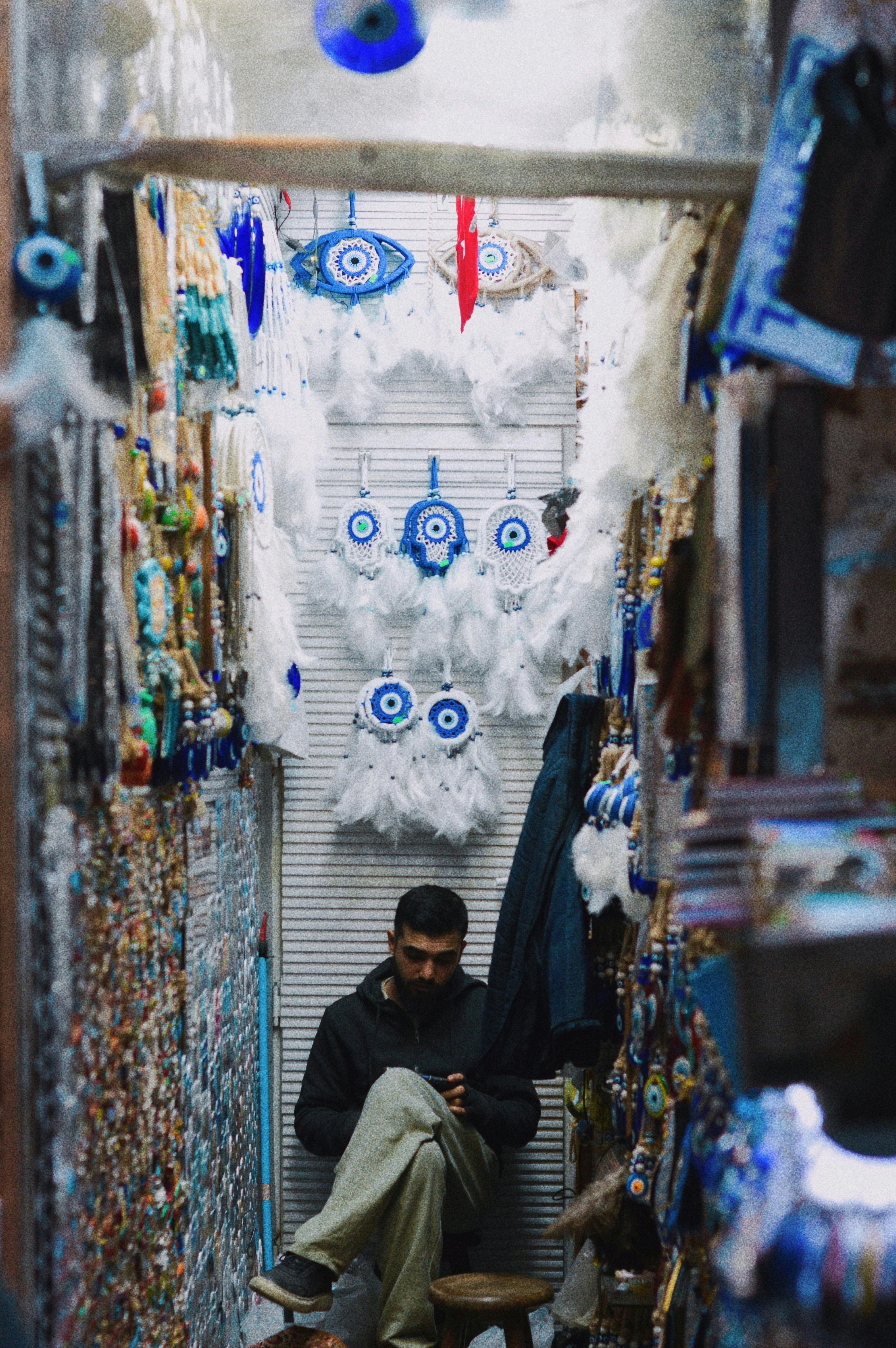 Market Stall with Evil Eye Amulets Display · Free Stock Photo
