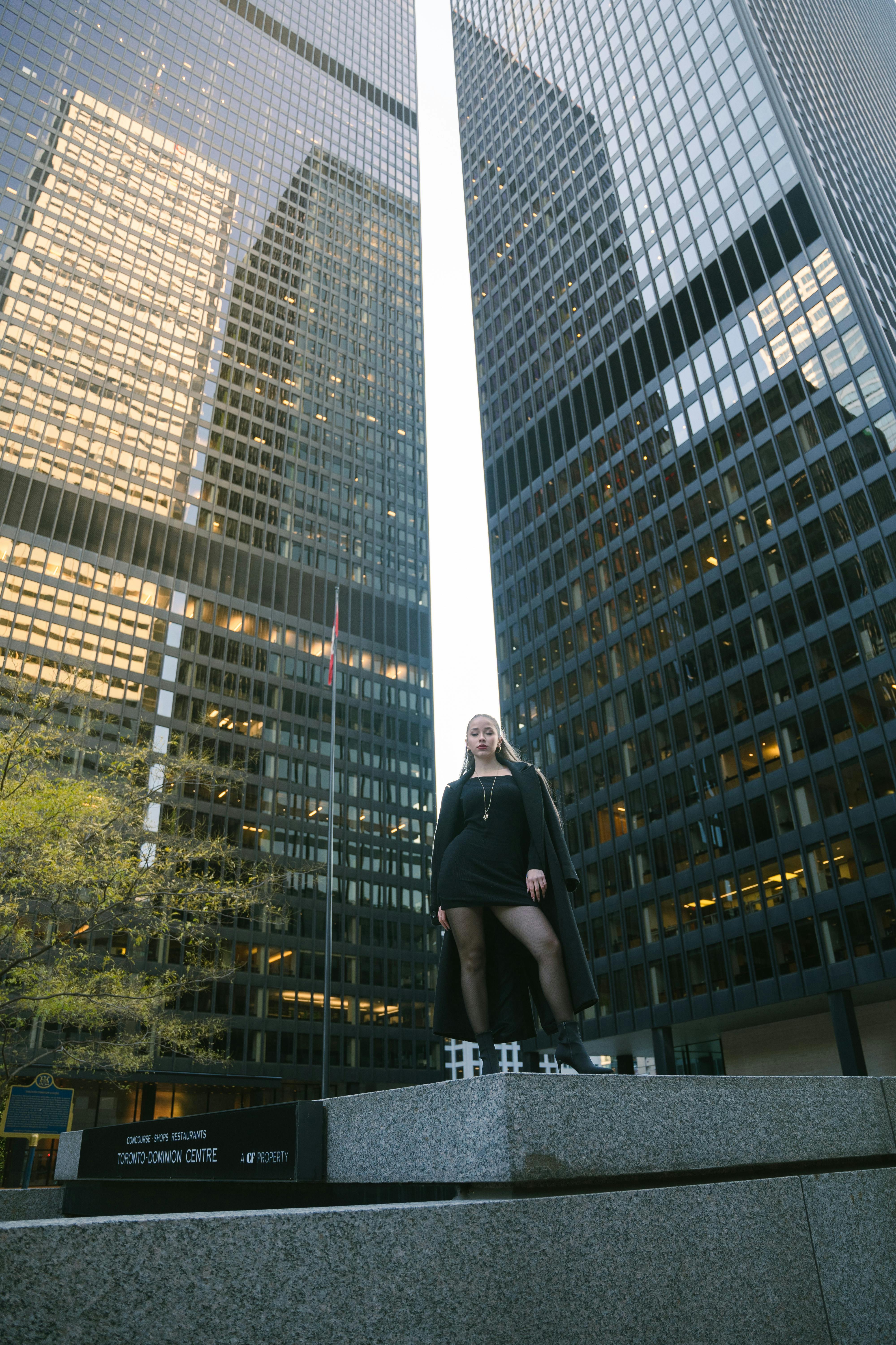 Low Angle View of Glass High Rise Building during Cloudy Daytime Photo ...