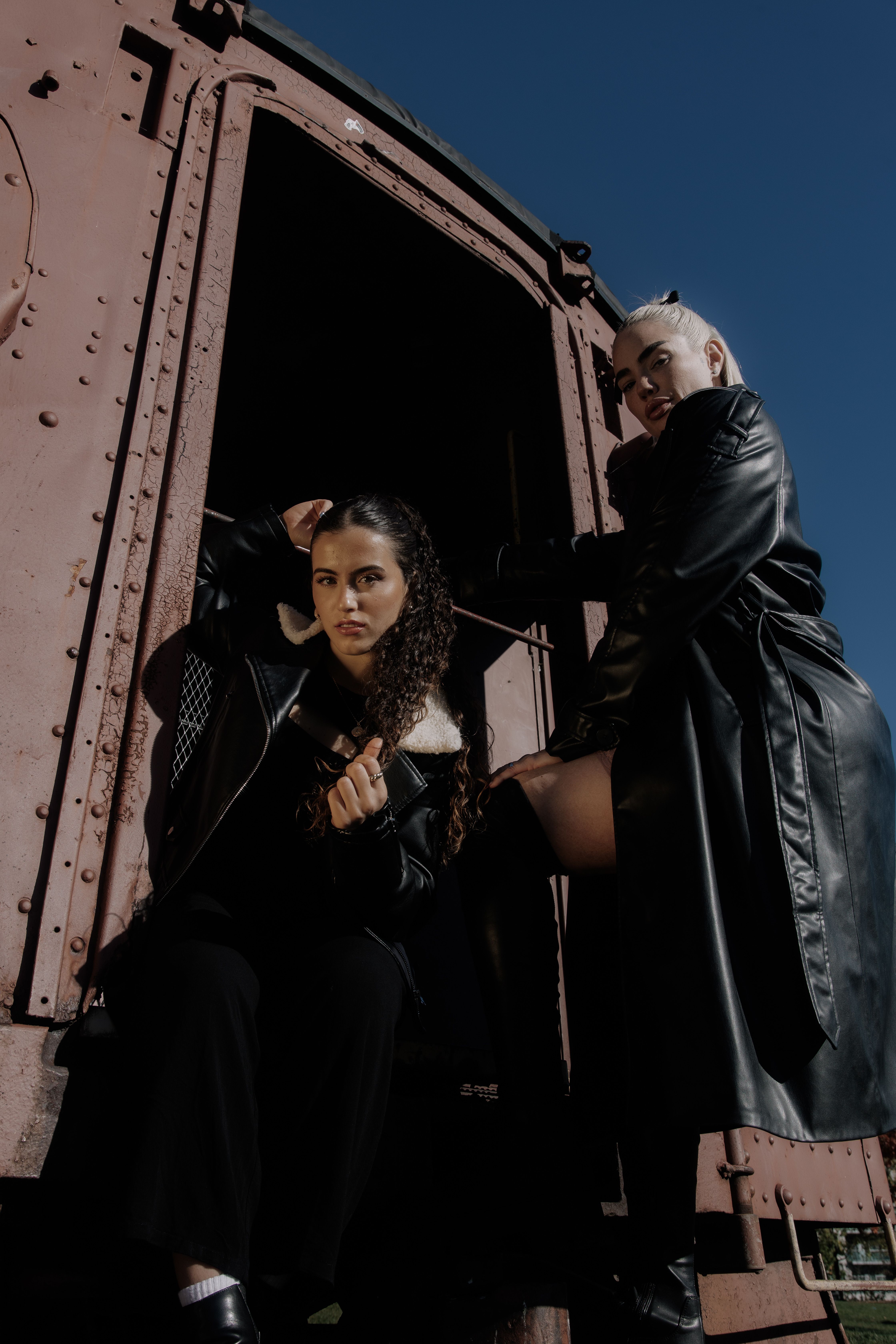 Edgy Fashion Portrait of Women on Old Train · Free Stock Photo