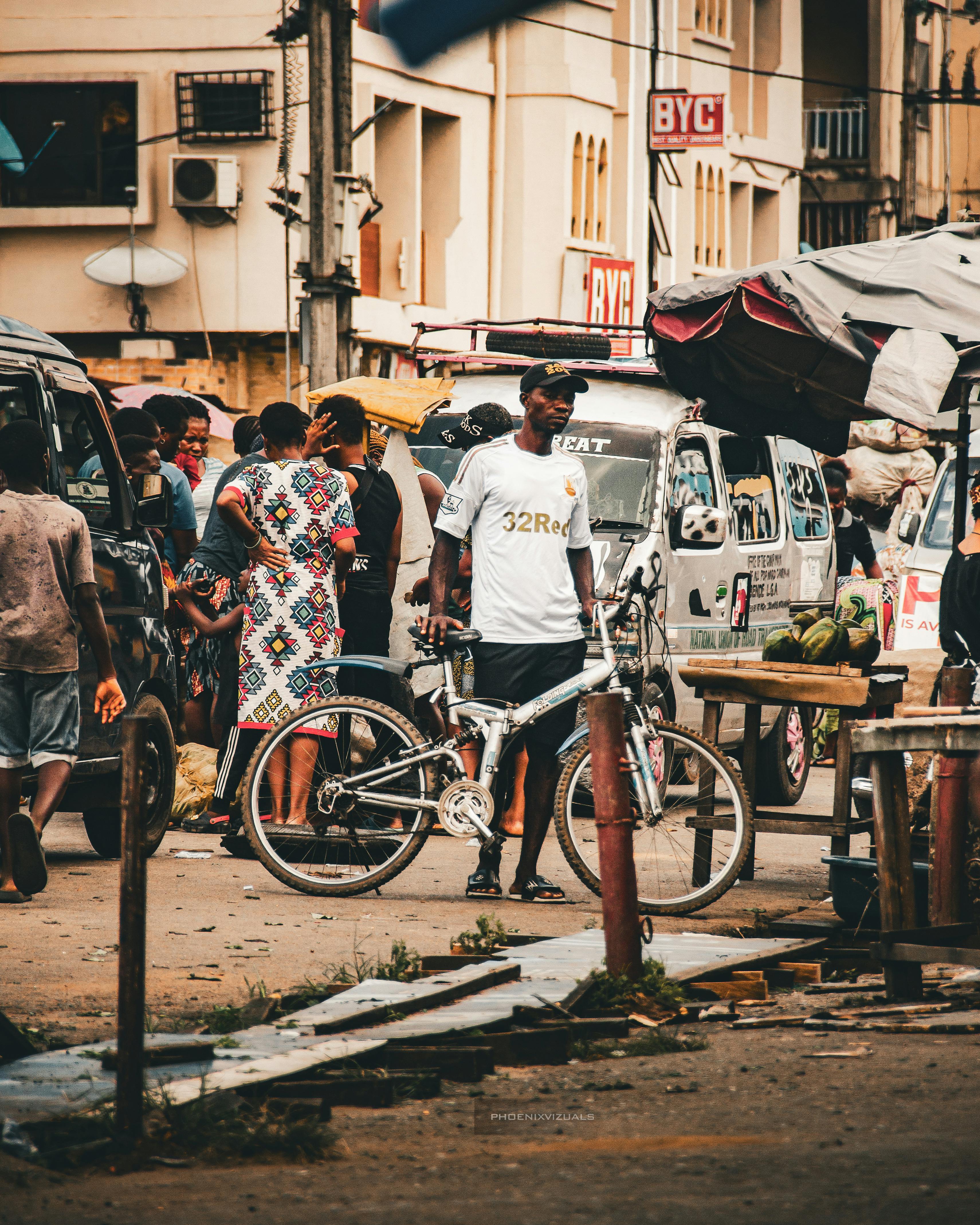 Bustling African Street Market Scene with People · Free Stock Photo