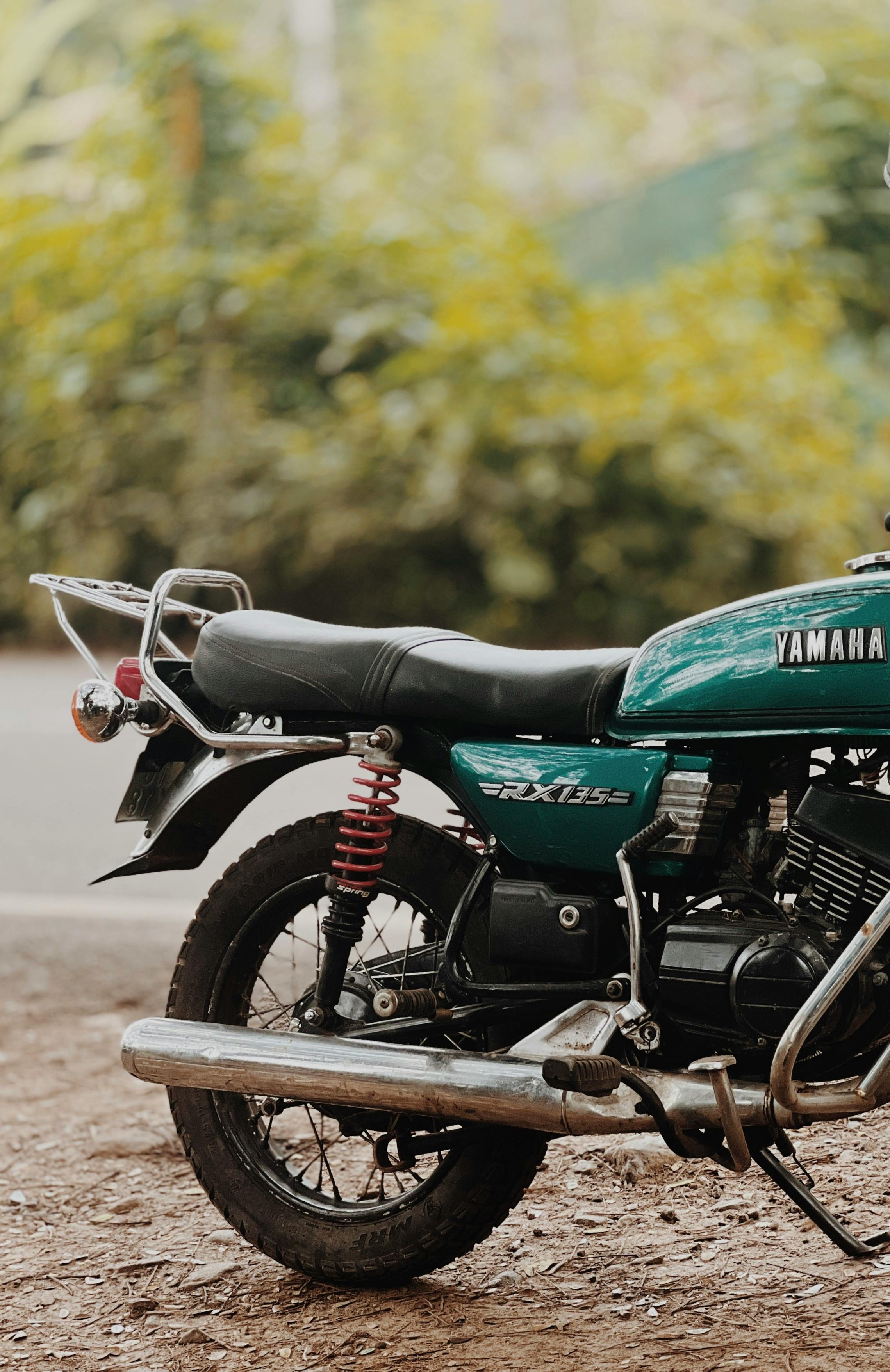 Classic Yamaha RX135 Motorcycle in Indian Countryside · Free Stock Photo