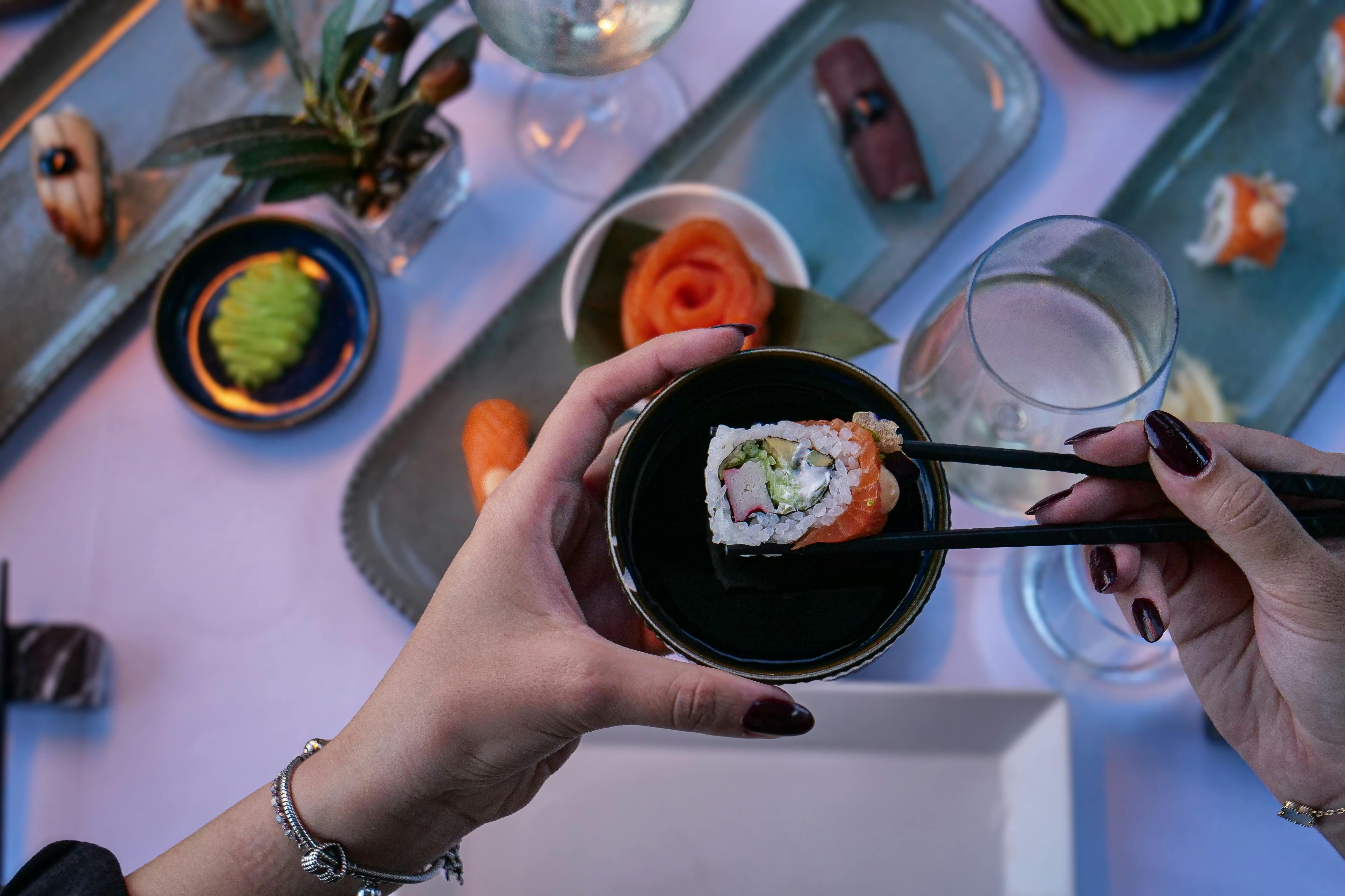 Elegant Outdoor Sushi Dining Experience · Free Stock Photo