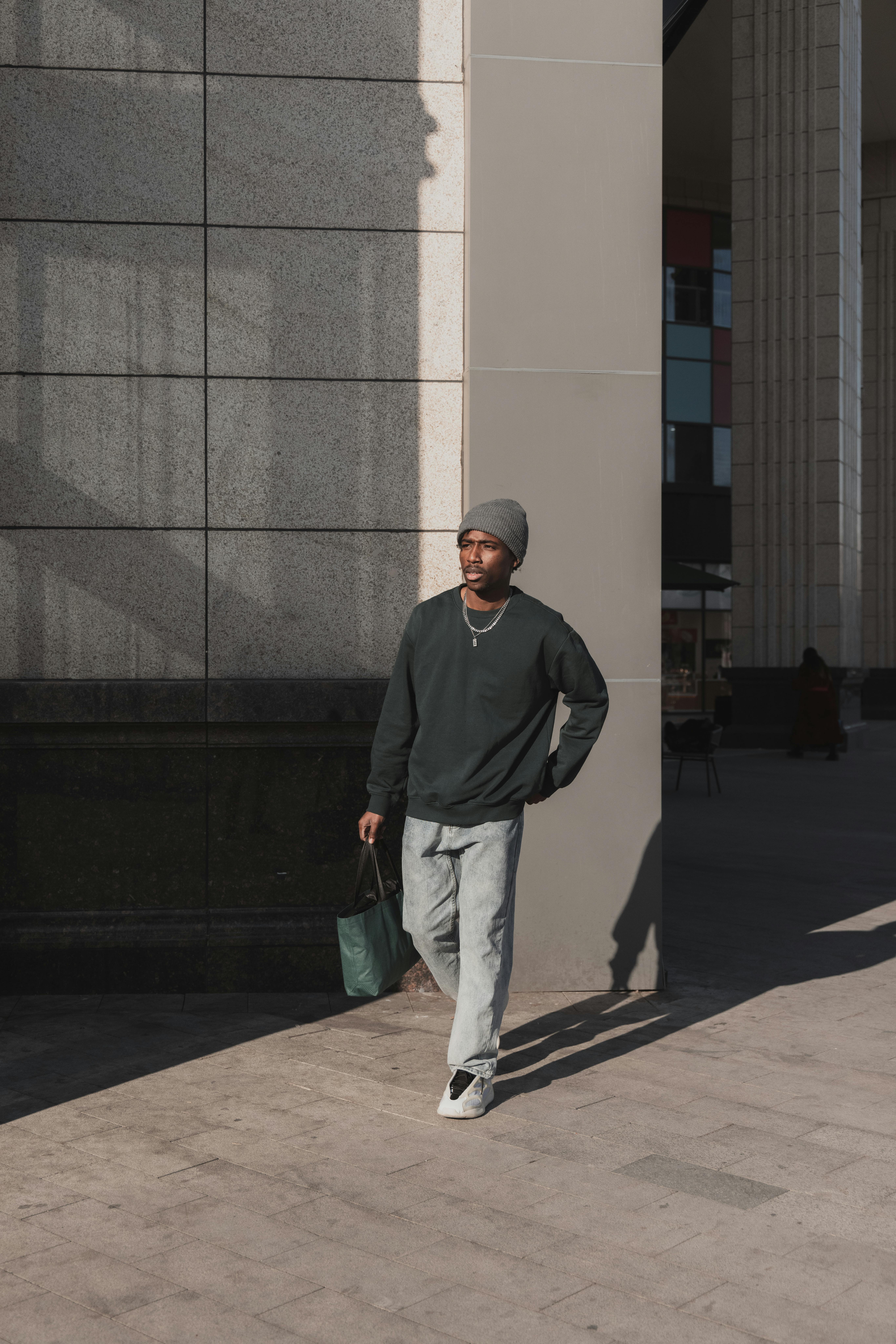 Urban Fashion Model in Modern Cityscape · Free Stock Photo