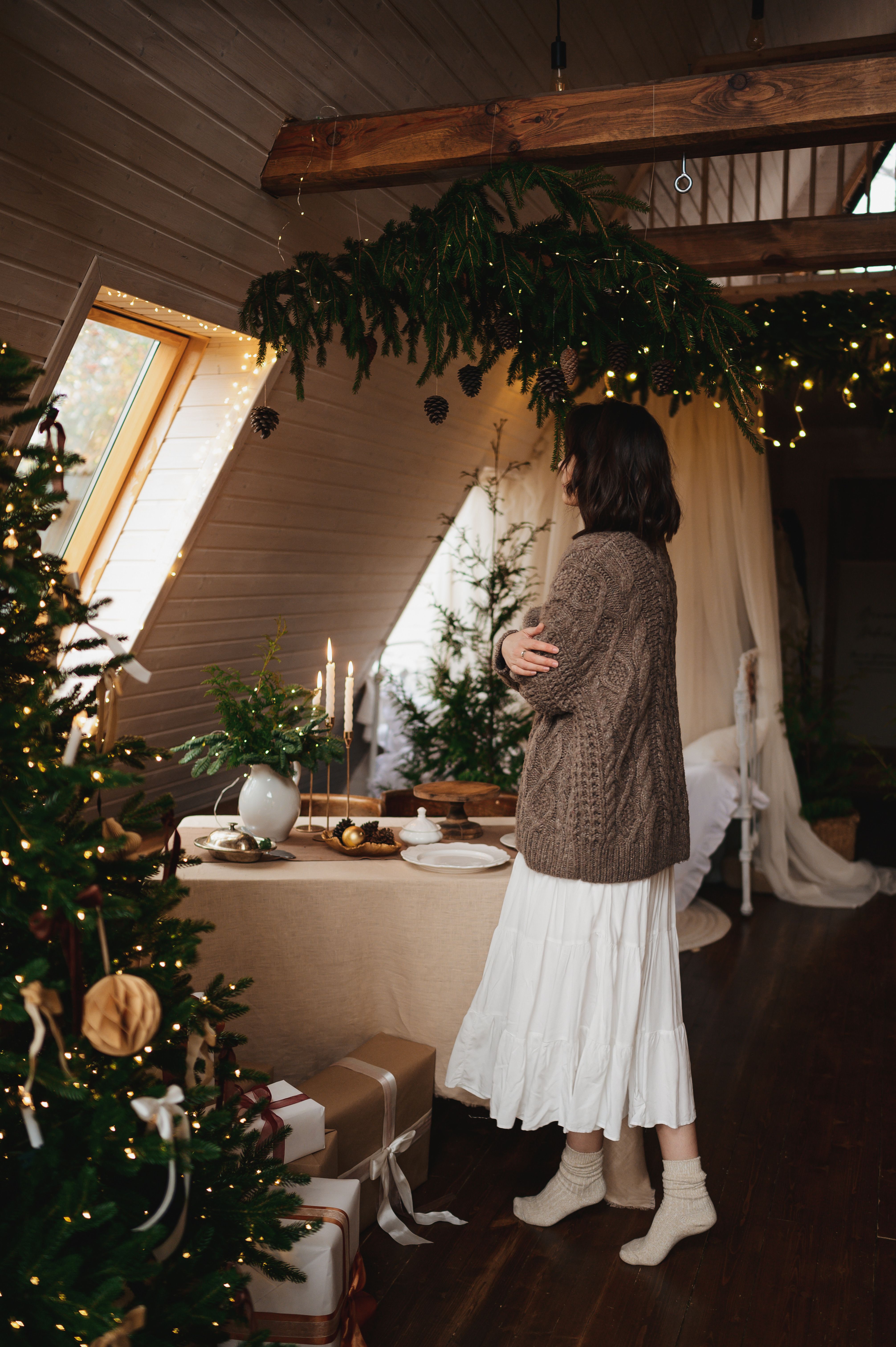 Cozy Holiday Celebration in Rustic Attic Setting · Free Stock Photo